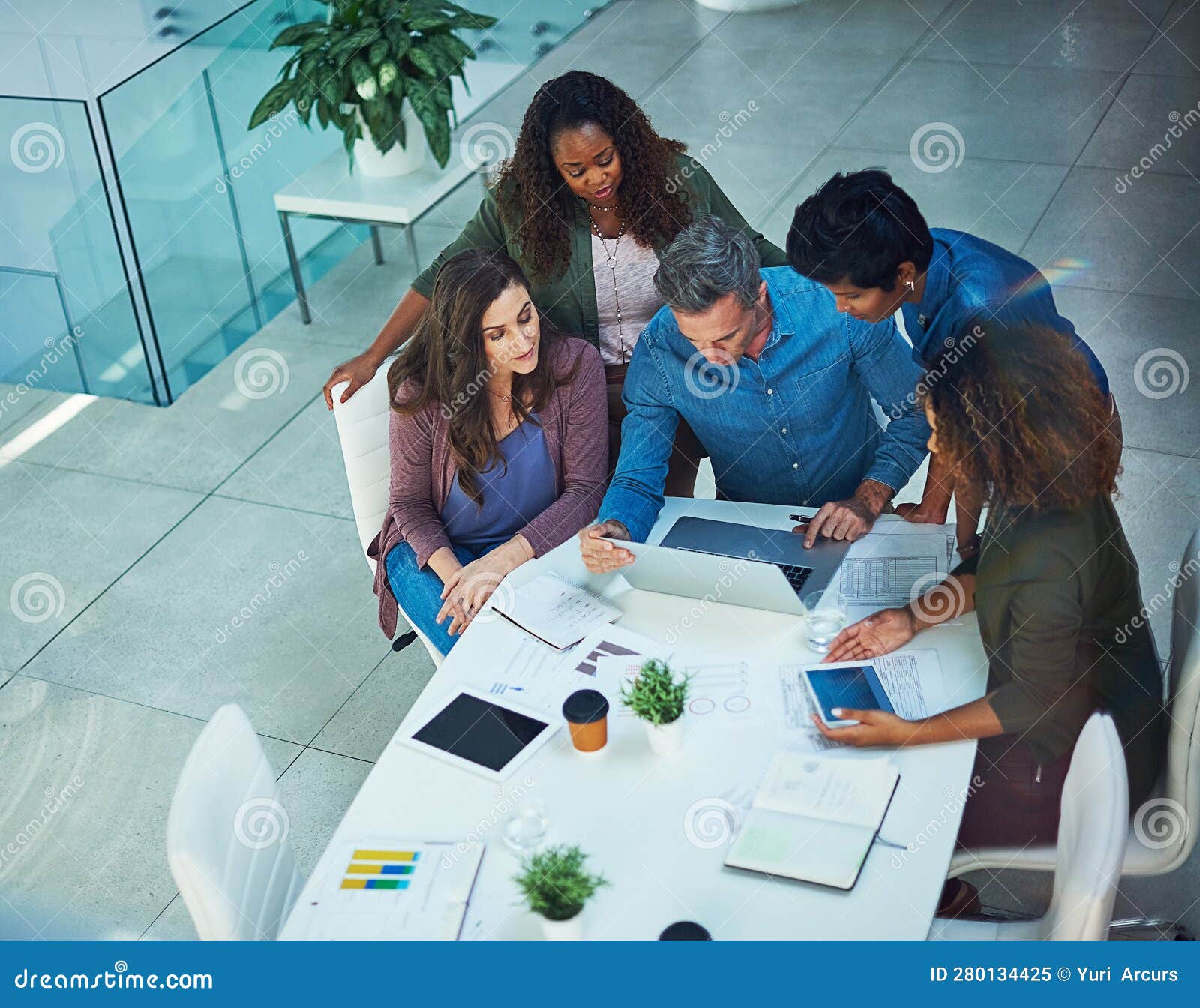 Make Technology Work for You. a Group of Designers Gathering Around a ...