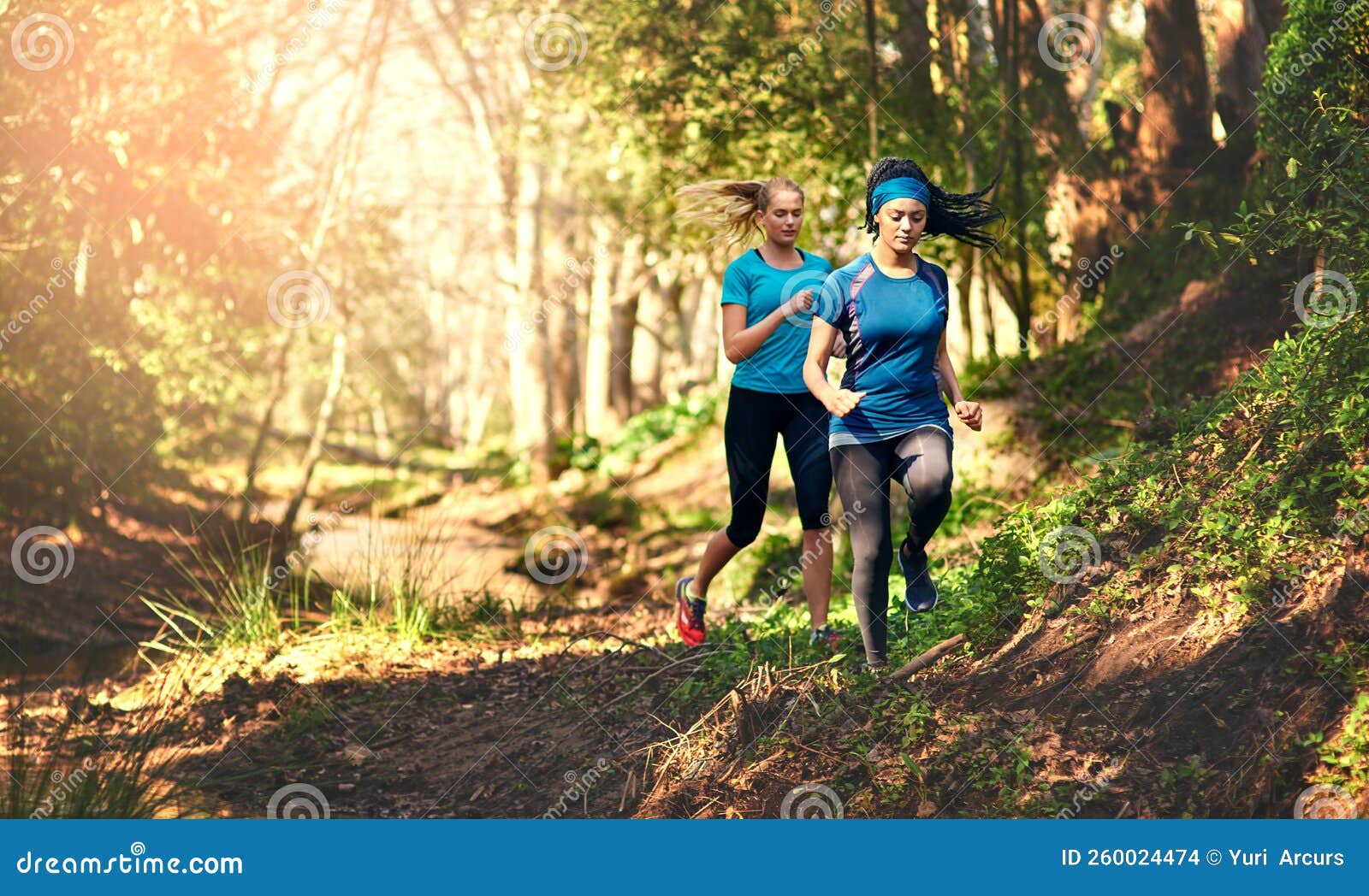 We Make Time for Exercise and Adventure. Two Sporty Young Women Out ... We Make Time for Exercise and Adventure. Two Sporty Young Women Out ...