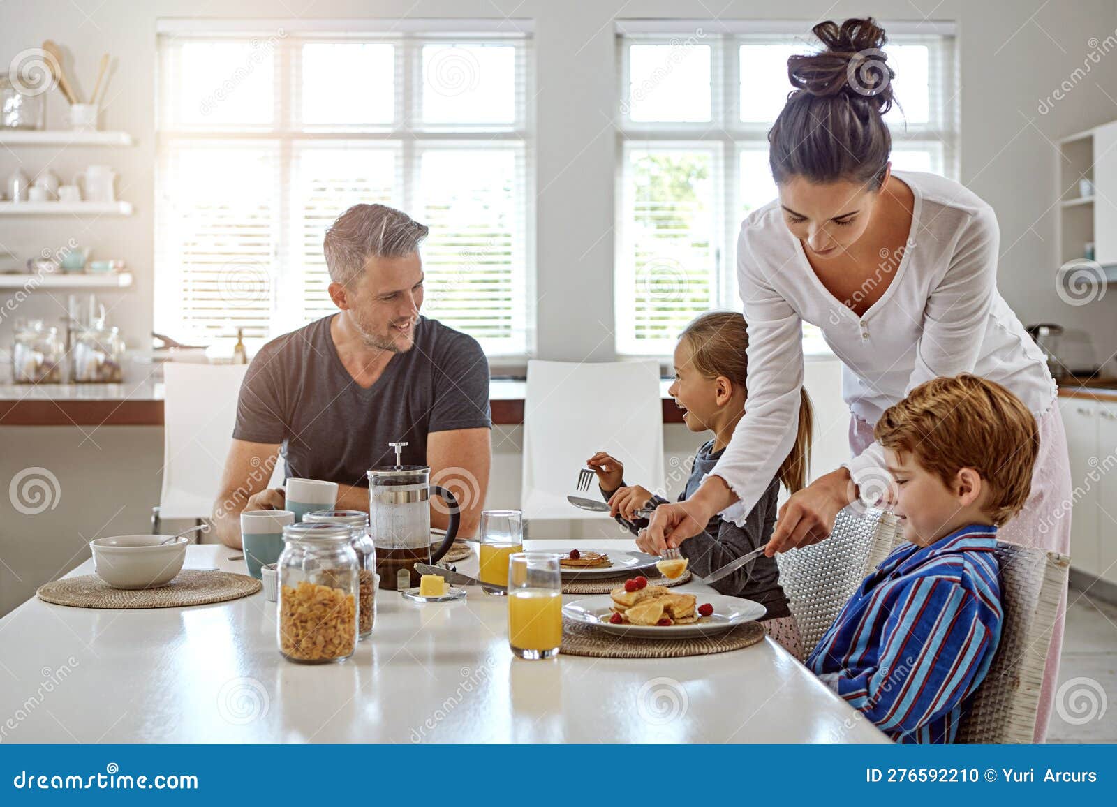 They always Make Time To Bond. a Family Having Breakfast Together ...
