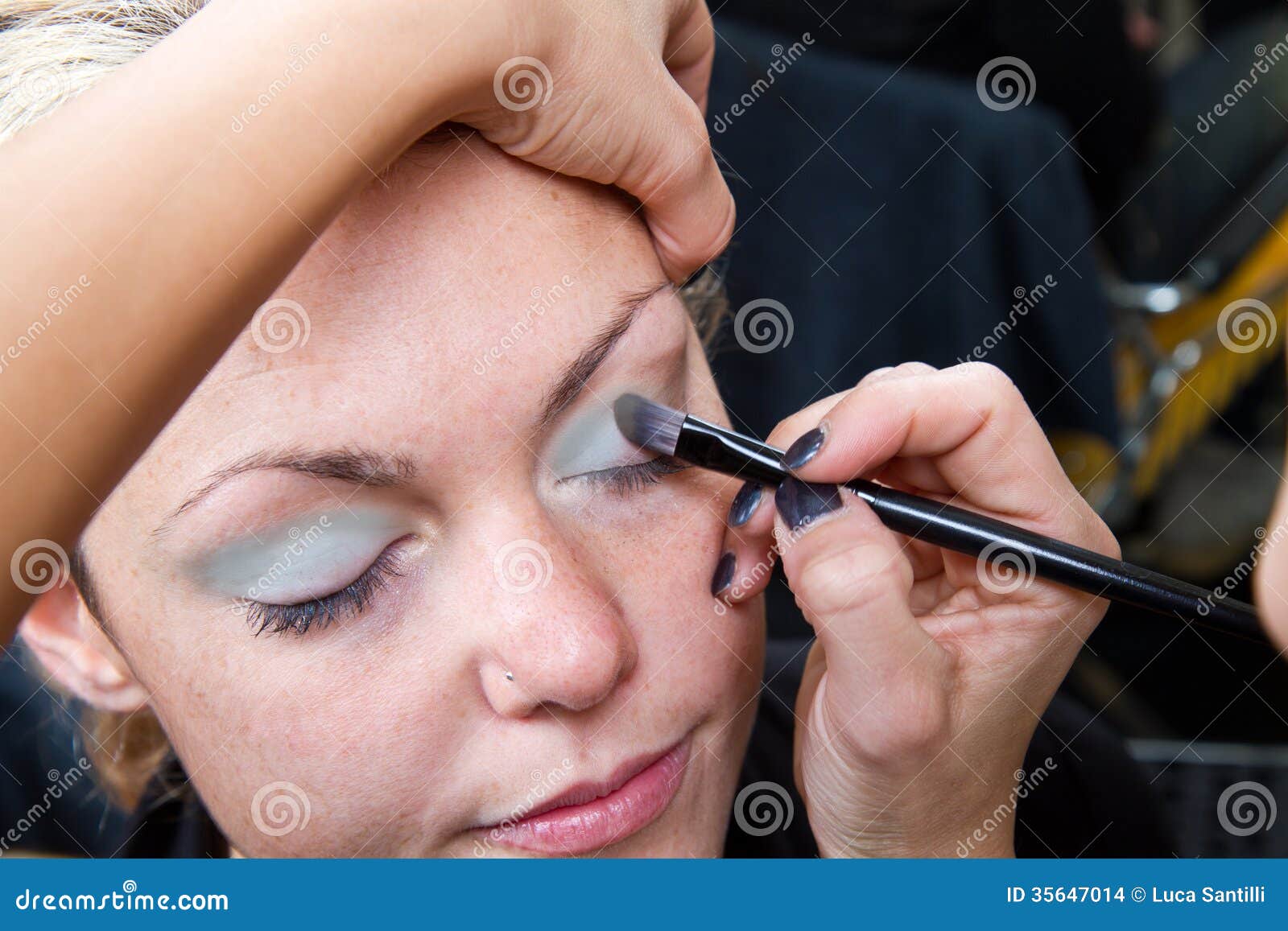 Make-up Artist Applying Eyebrow Make-up Stock Photo - Image of ...