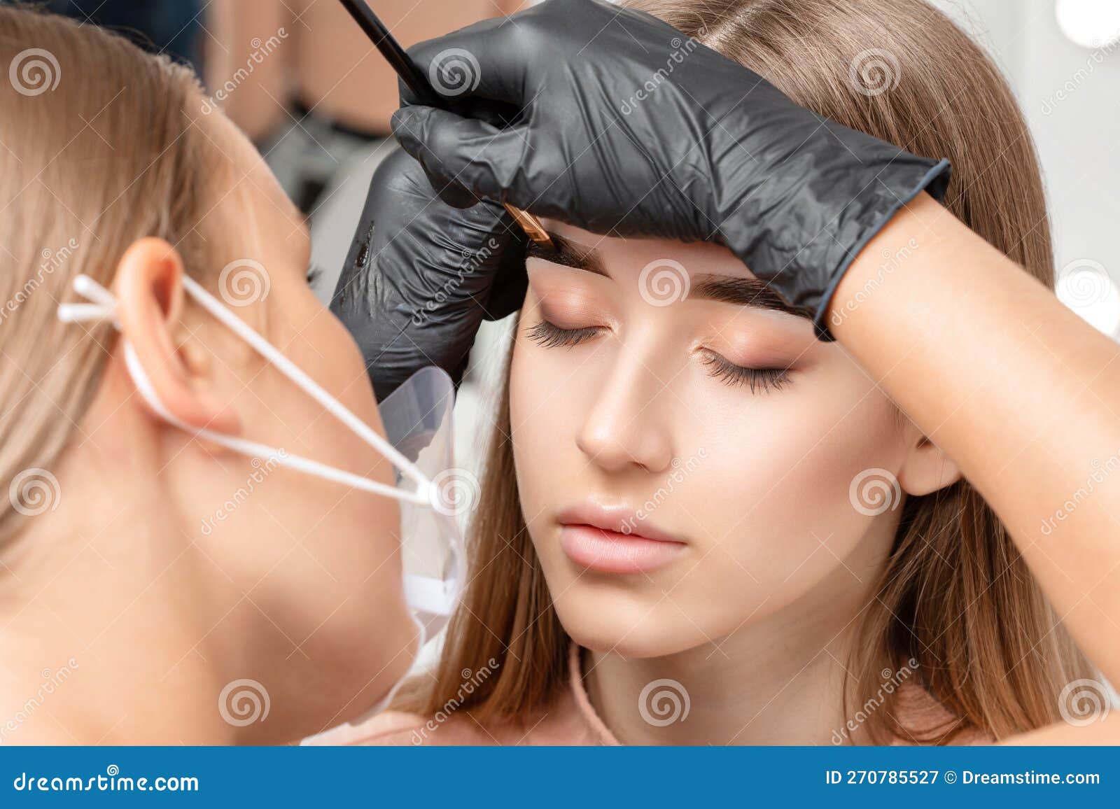 The Make-up Artist Does Long-lasting Styling of the Eyebrows of the ...