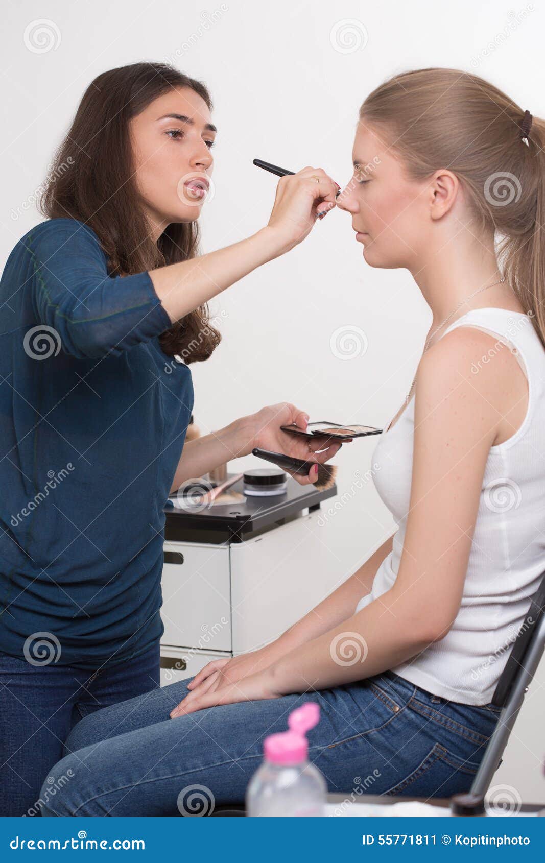 Make-up Artist Doing Make-up of a Beautiful Young Stock Image - Image ...