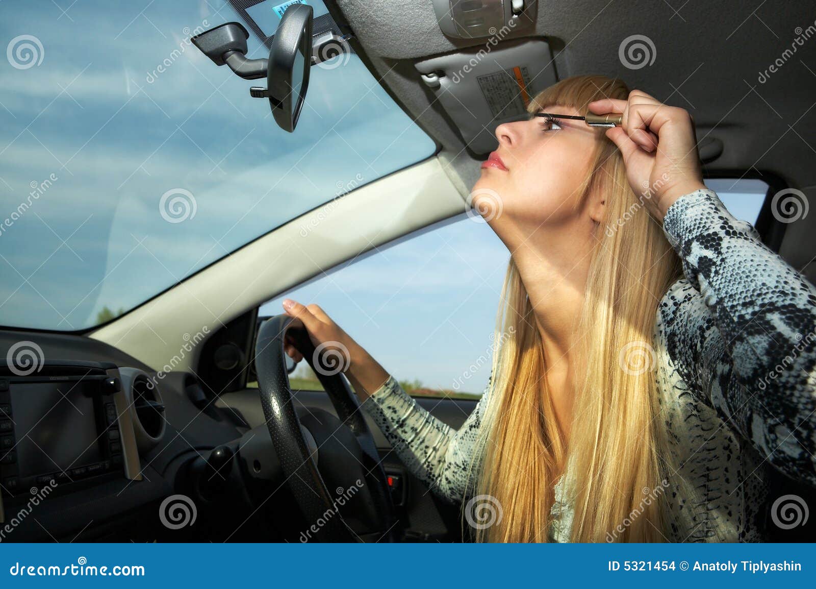 Make-up in car driving stock photo. Image of blonde, eyelashes - 5321454