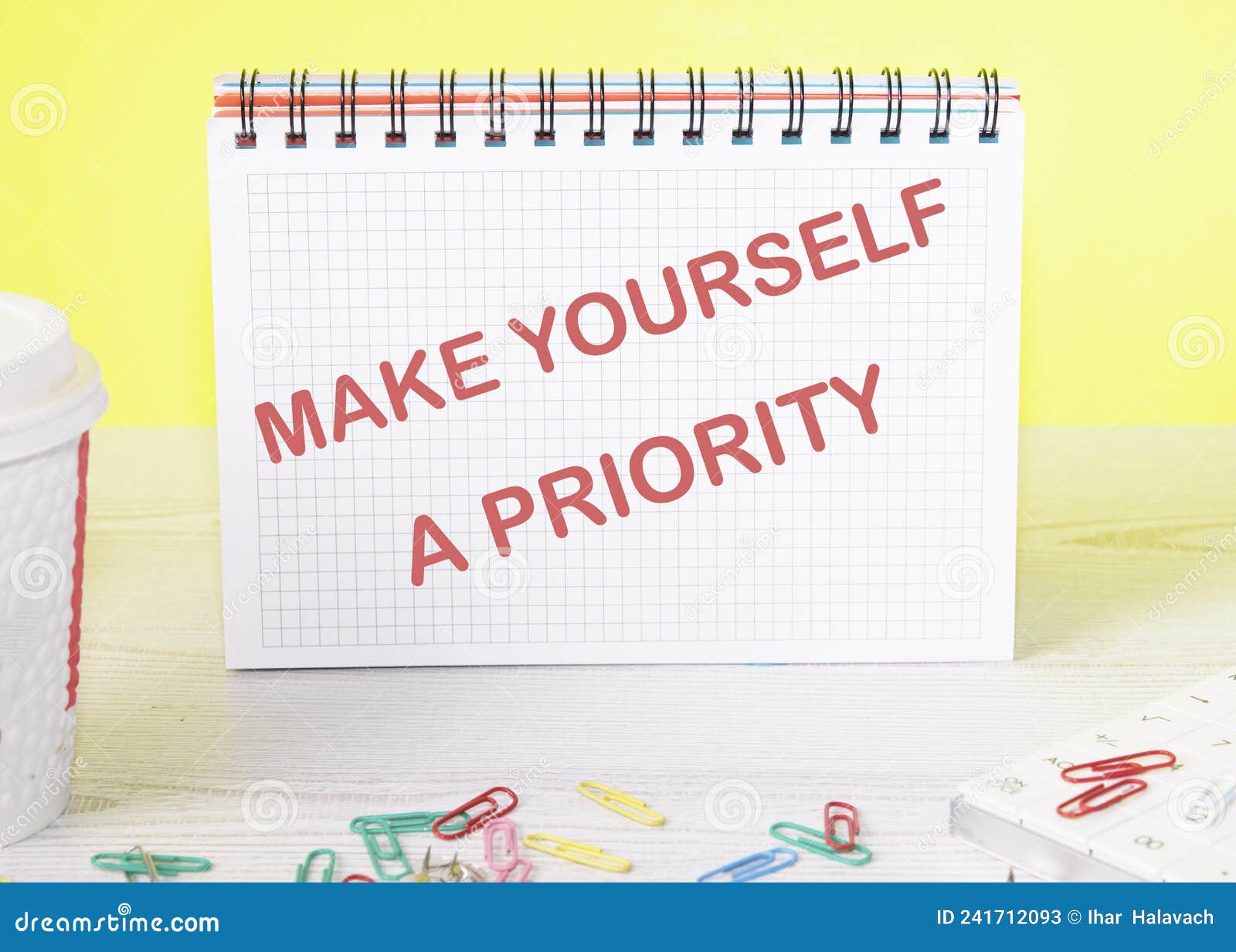 Make Yourself a Priority Text on a Notebook Standing on a Table on a ...