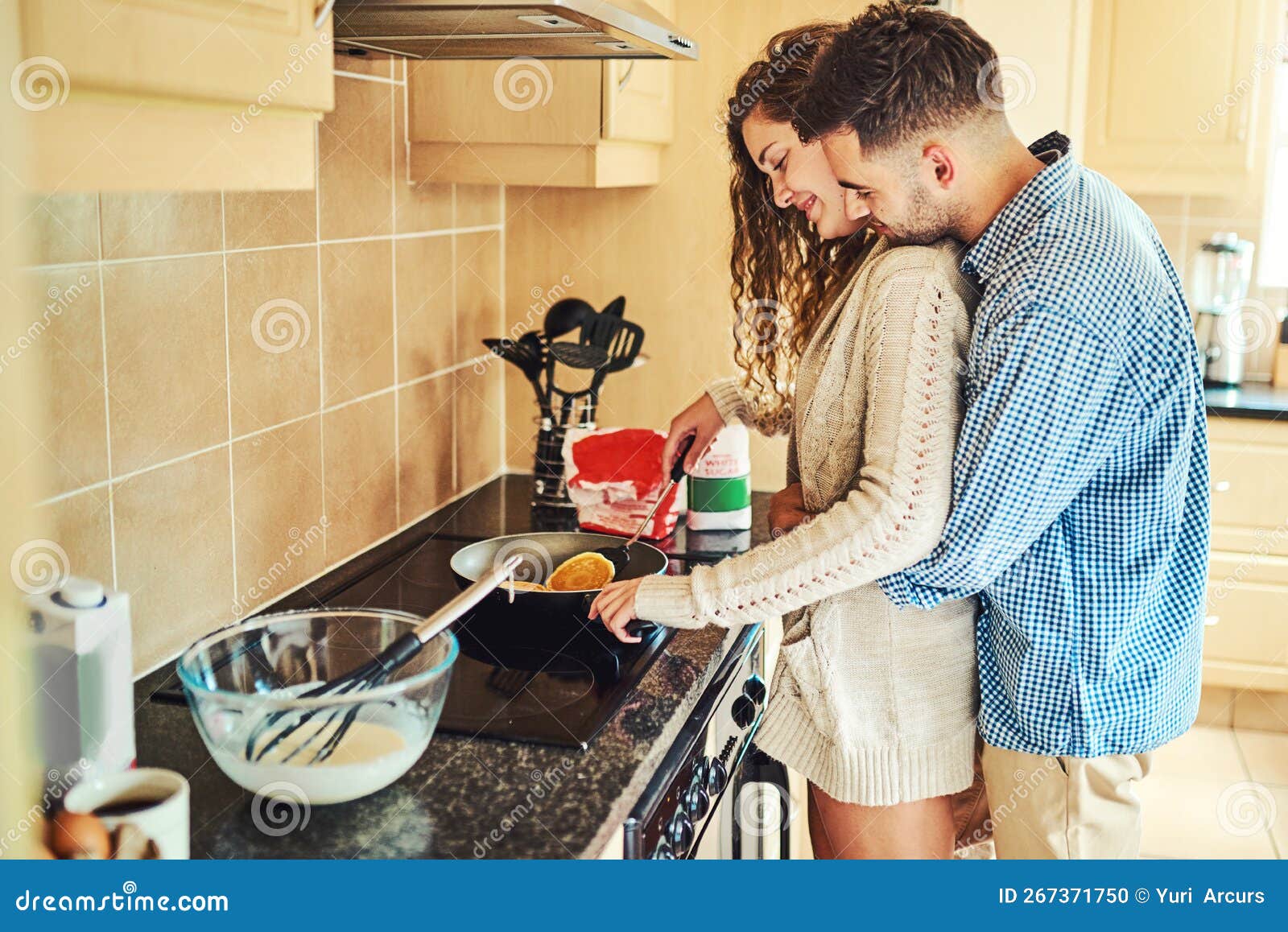 He Makes Everything Turn Out Perfect. a Young Couple Working in the ...
