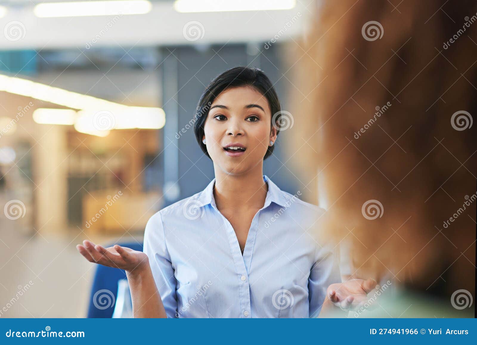 She Makes Some Good Points. a Coworkers Talking Together in an Office ...