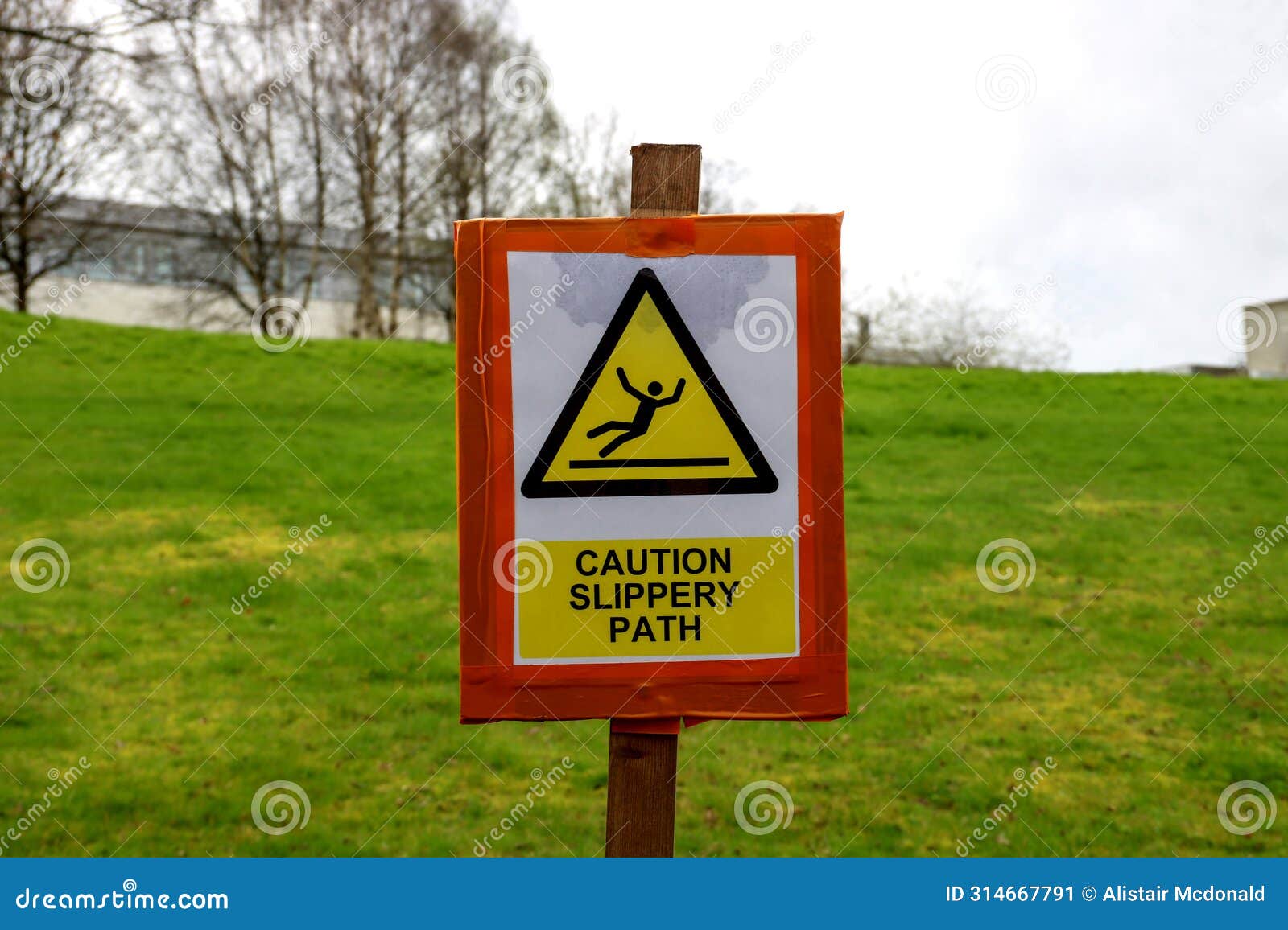 Makeshift Caution Slippery Path Signpost on a Rural Footpath Stock ...
