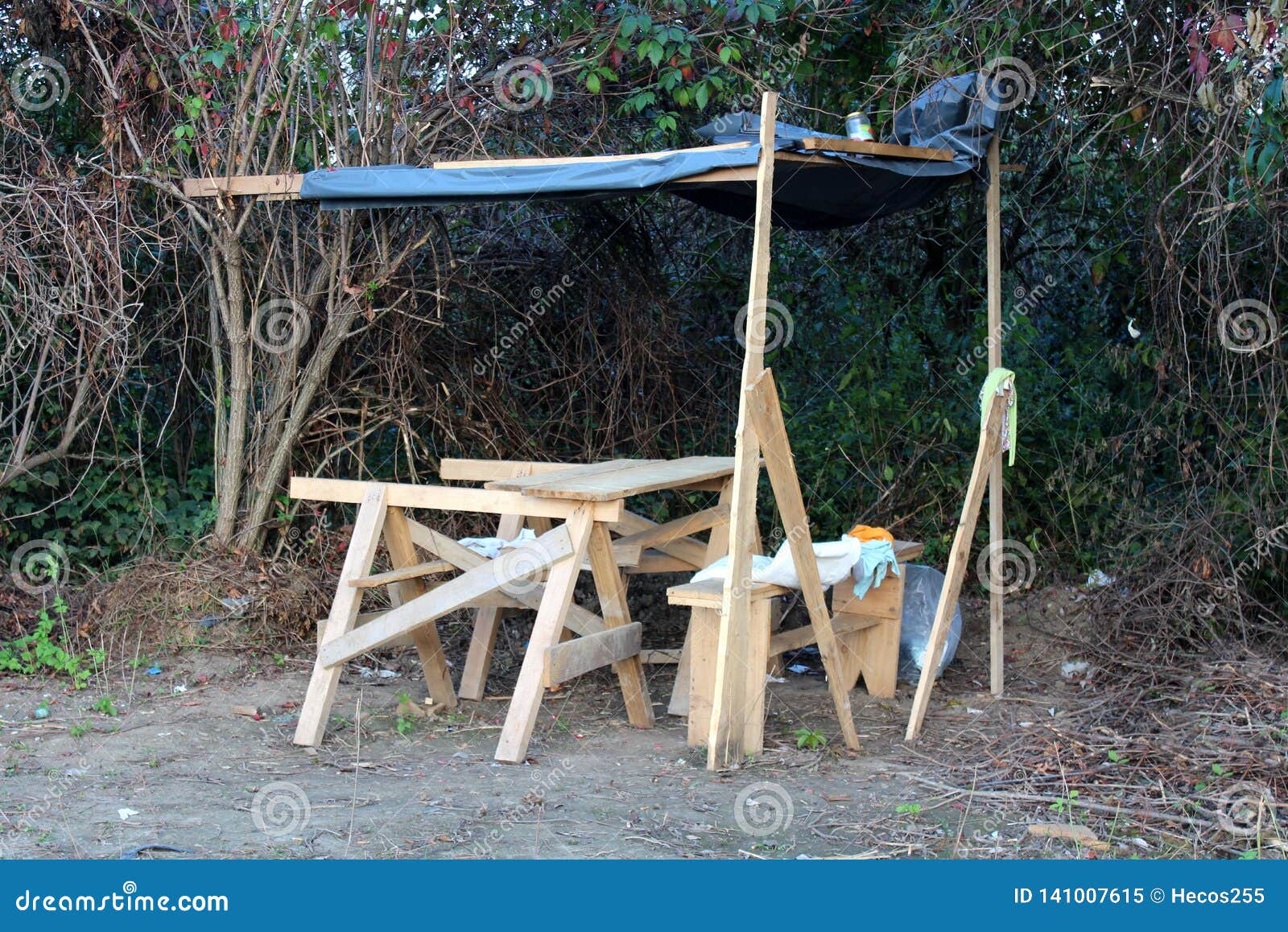 Makeshift Improvised Table and Bench with Small Roof Made of Cerade in ...