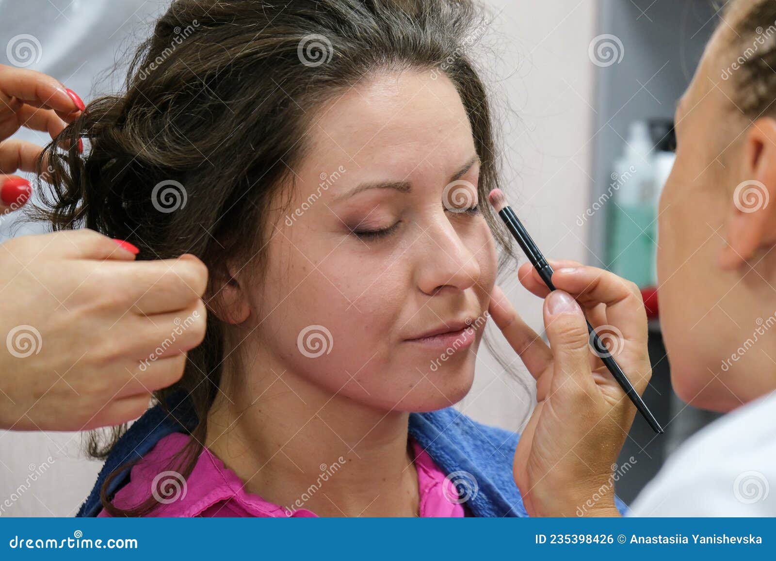 Makeup Artist Apply Makeup On The Eyes Of Young Woman Professional