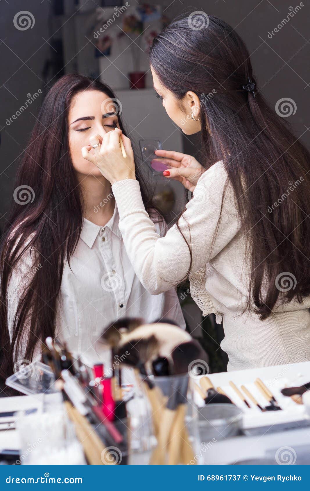Makeup artist apply makeup stock image. Image of application - 68961737