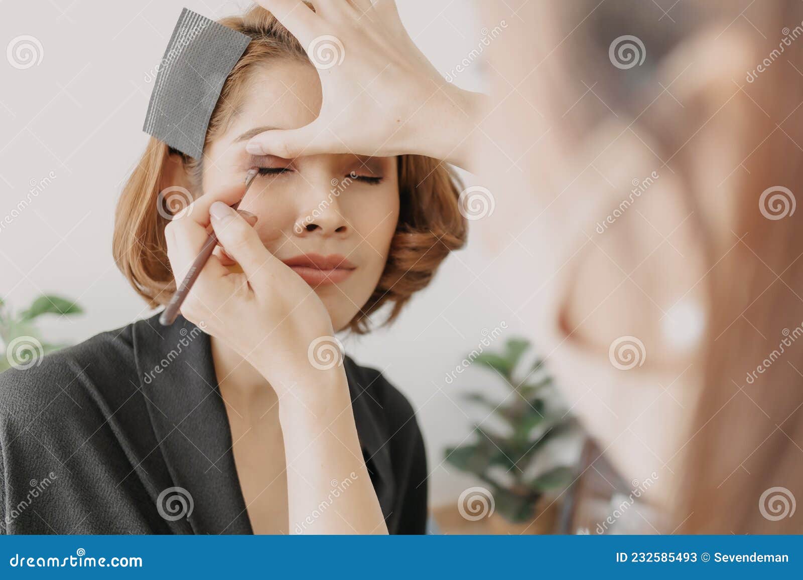 Makeup Artist is Applying Makeup on Client Eyes. Stock Image - Image of ...