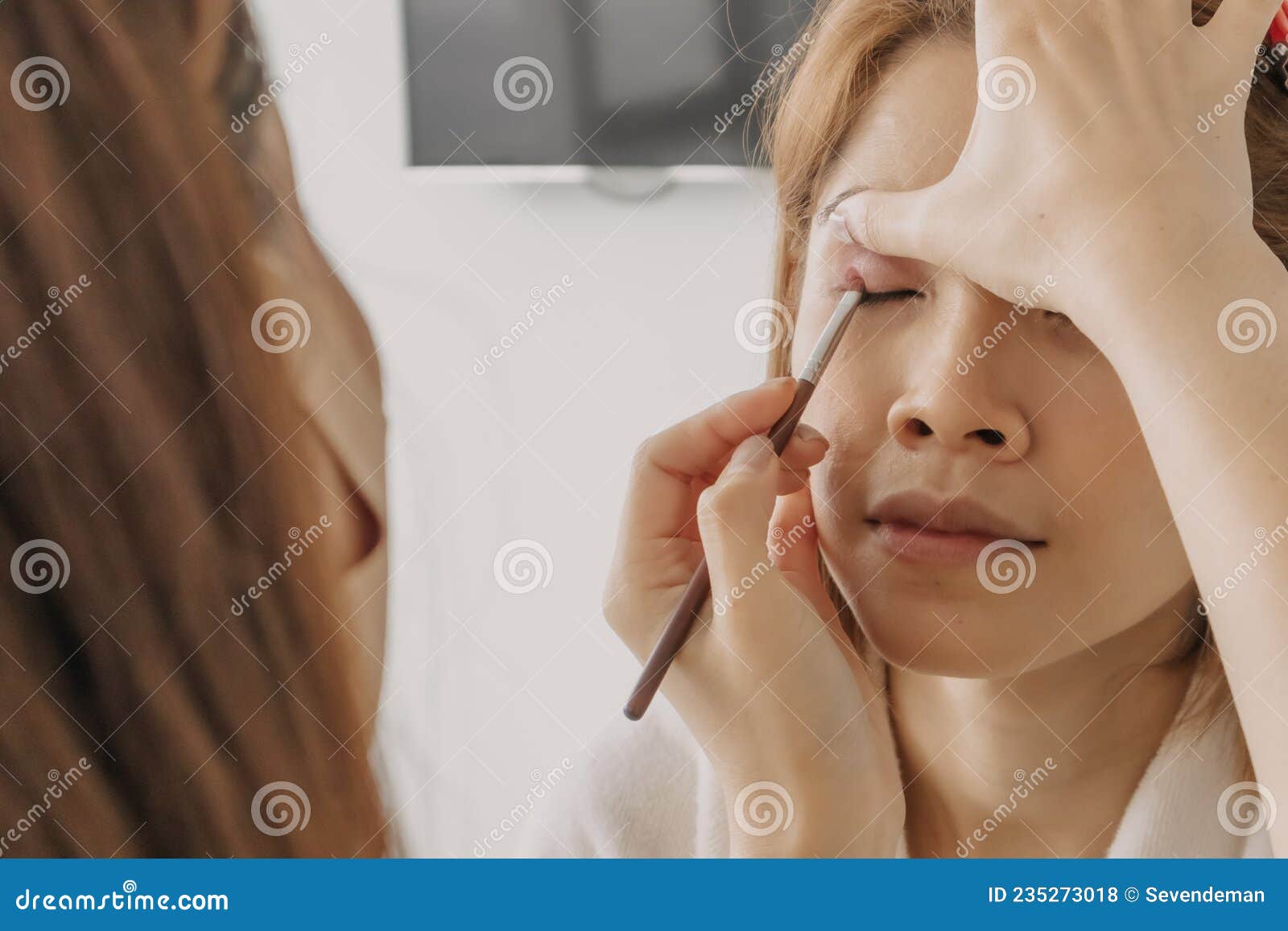 Makeup Artist is Applying Makeup on Client Eyes. Stock Photo - Image of ...