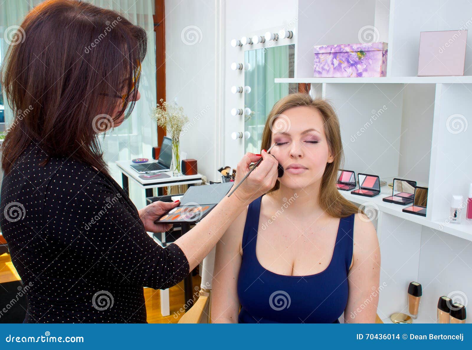 Makeup Artist Applying Eyeshadow on Womans Eyes Stock Photo - Image of ...