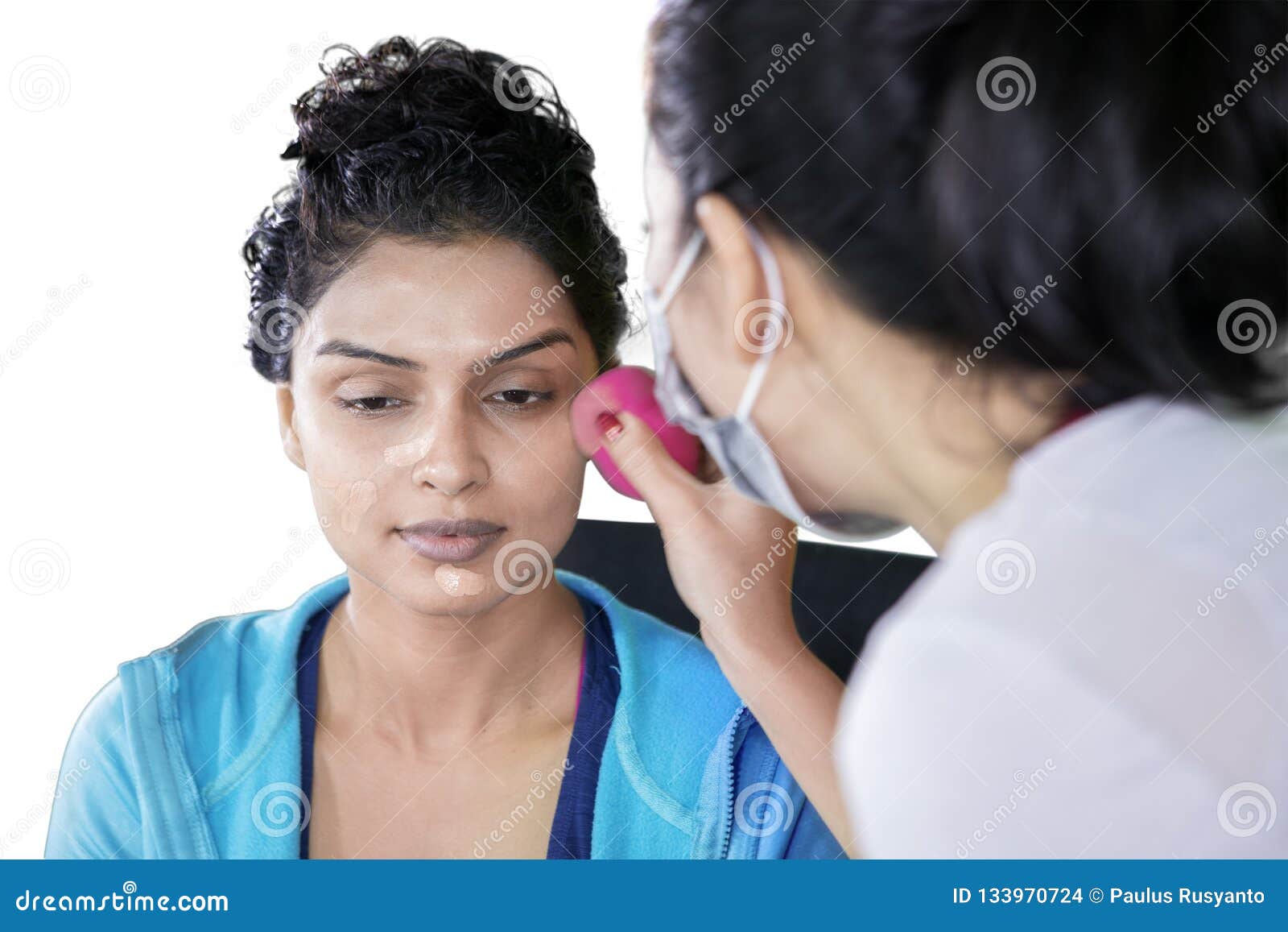 Makeup Artist Applying Foundation on Her Client Face Stock Photo ...