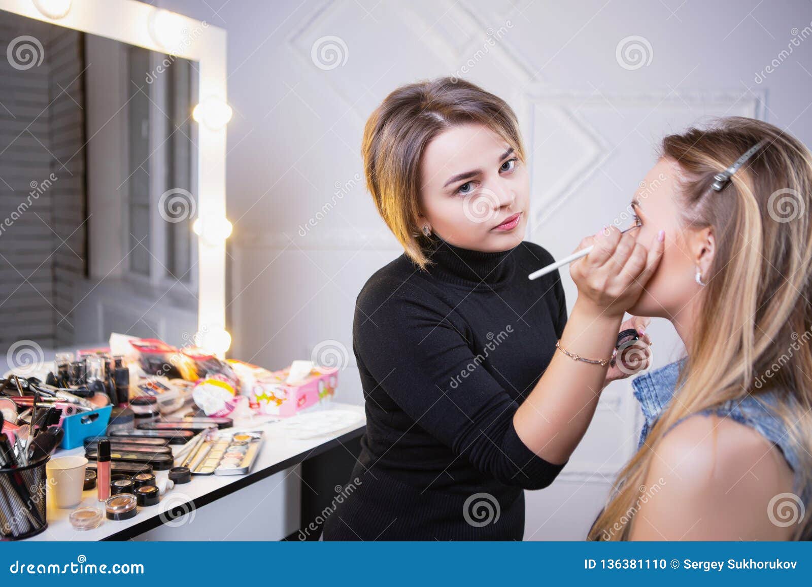 Makeup Artist Applying Make Up on Beautiful Model Stock Photo - Image ...