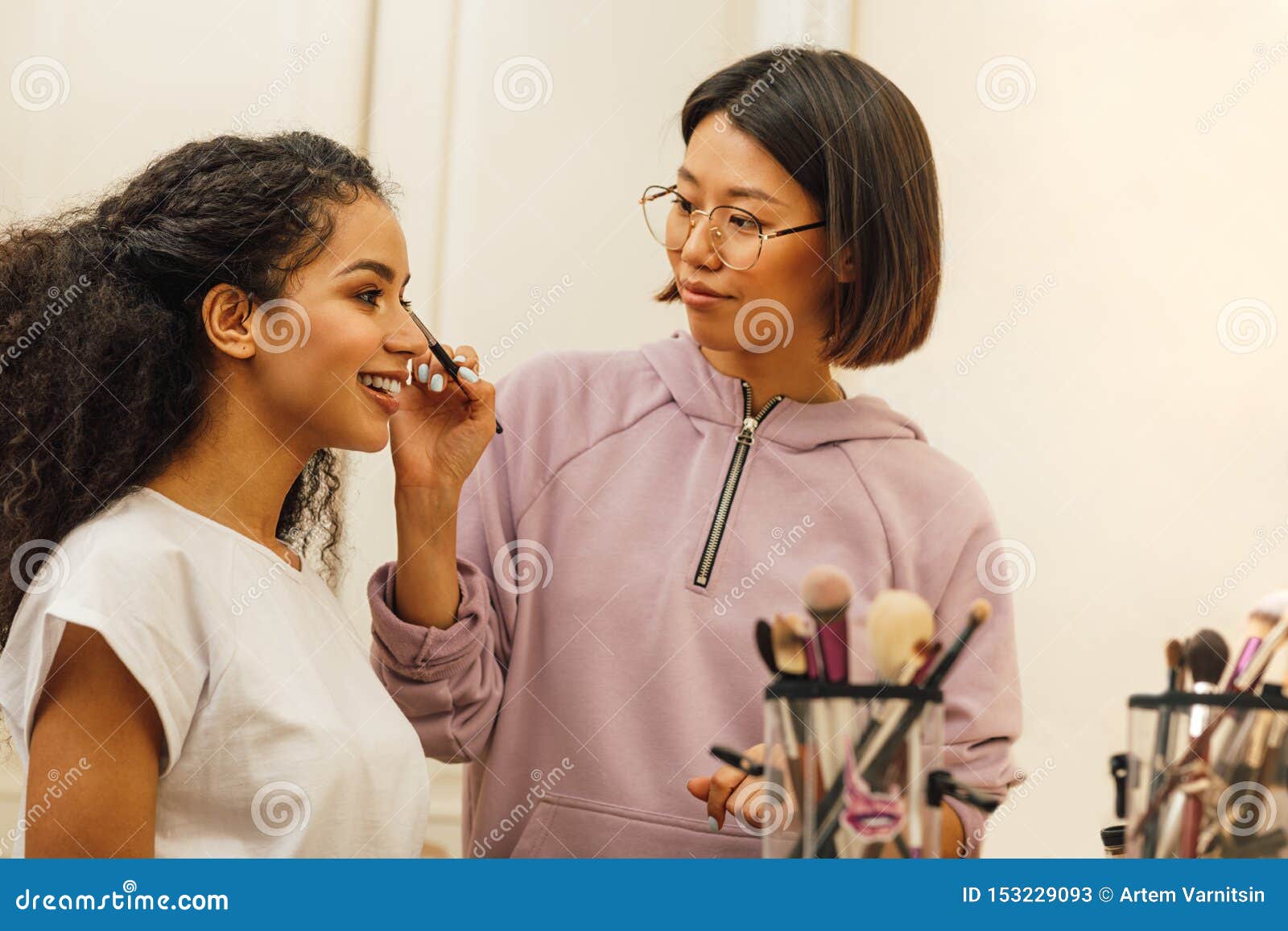 Makeup Artist Applying Makeover on a Model Face Stock Image - Image of ...