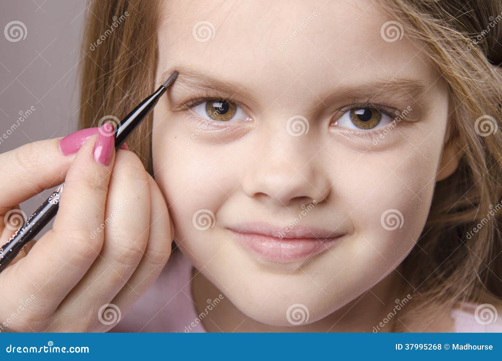 Makeup Artist Brings Eyebrows on the Girl S Face Stock Photo - Image of ...
