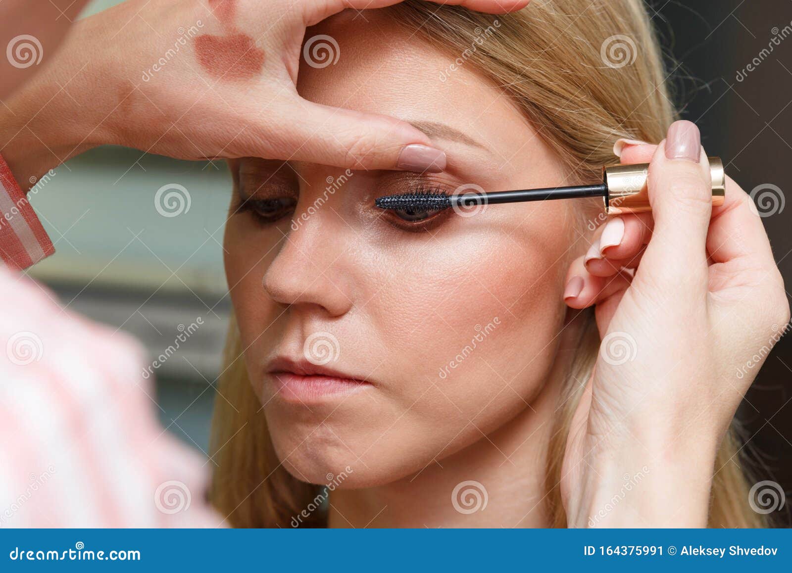 Makeup Artist Creates Voluminous Eyelashes of the Model Stock Image ...