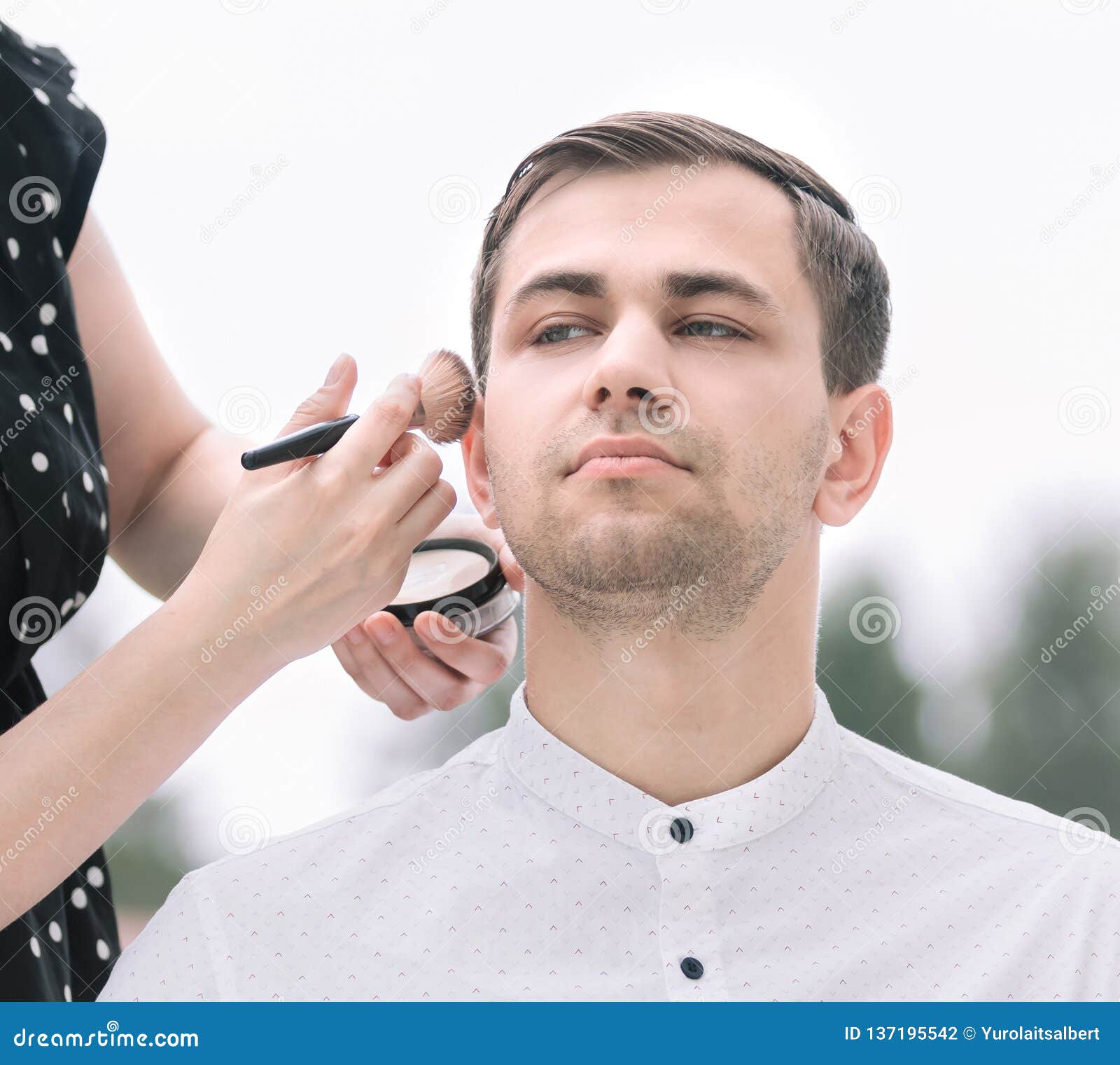 Makeup Artist Doing Makeup for a Young Man Stock Photo - Image of ...