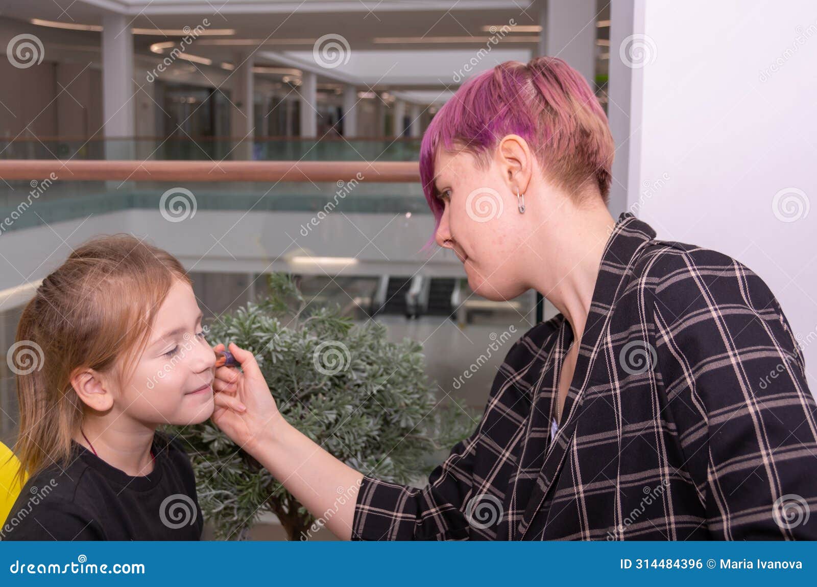 A Makeup Artist Makes Makeup for a Child Editorial Photo - Image of ...