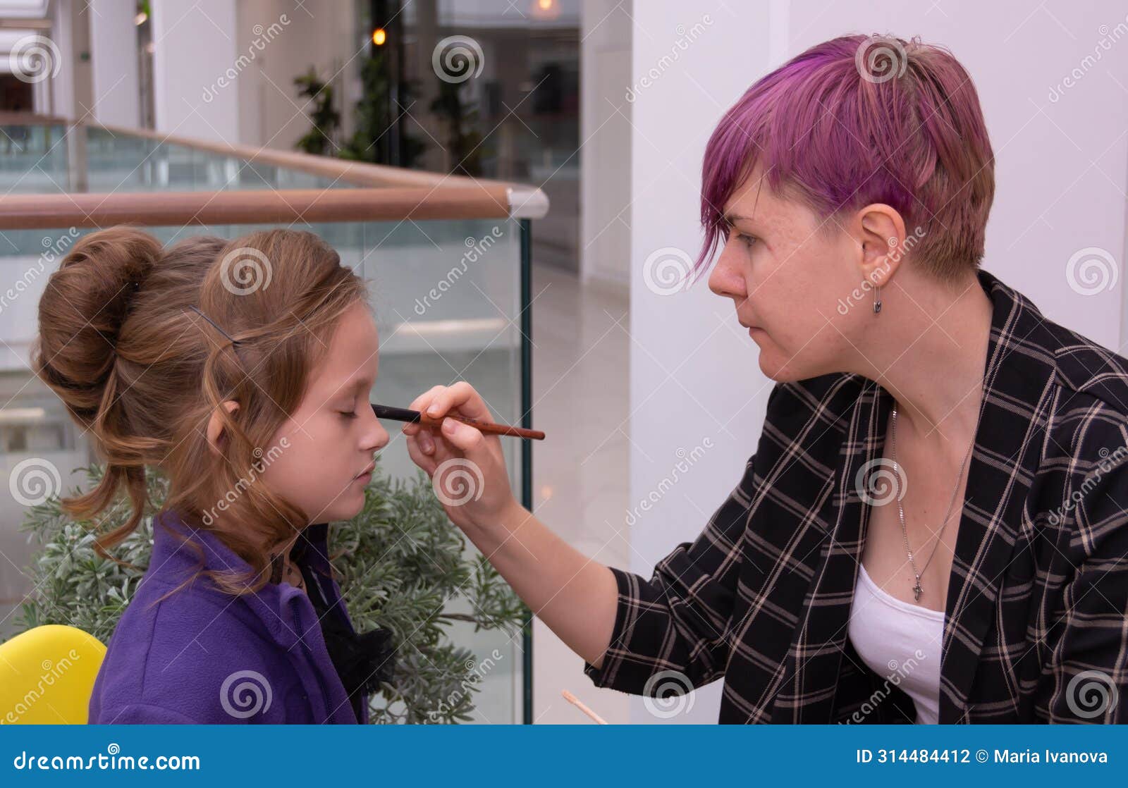 A Makeup Artist Makes Makeup for a Child Editorial Photography - Image ...