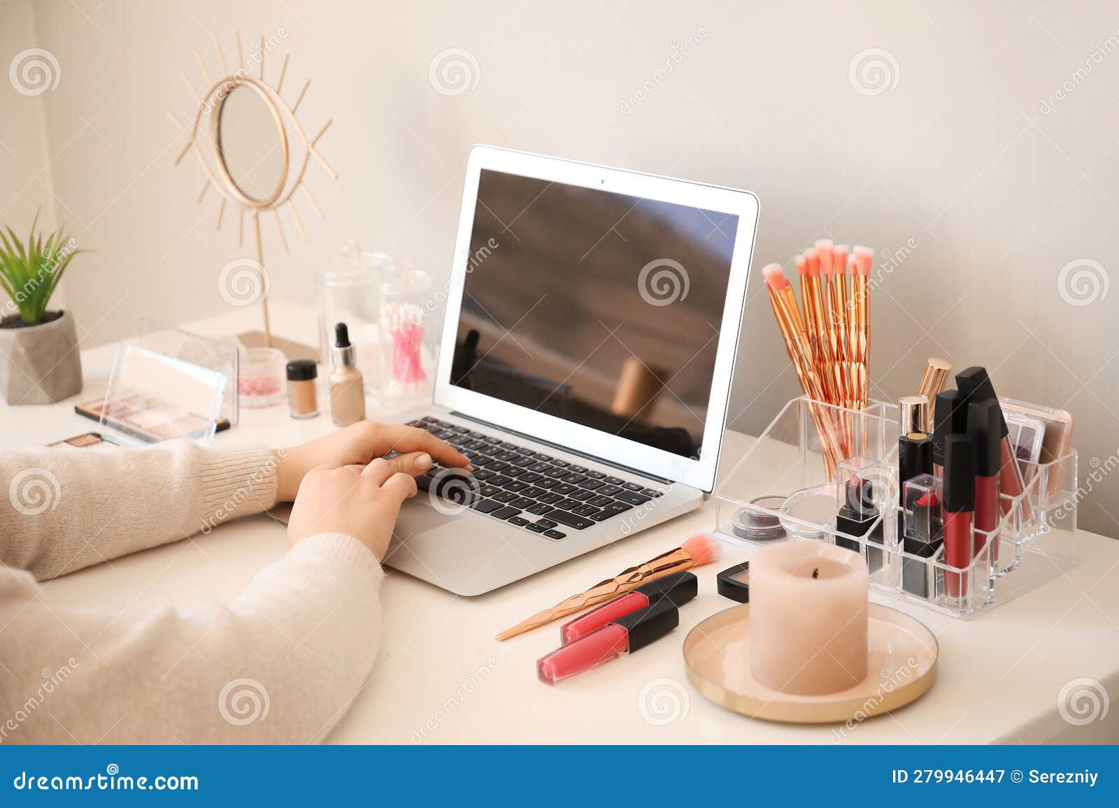 Makeup Artist at Table with Modern Laptop and Cosmetics Stock Image ...