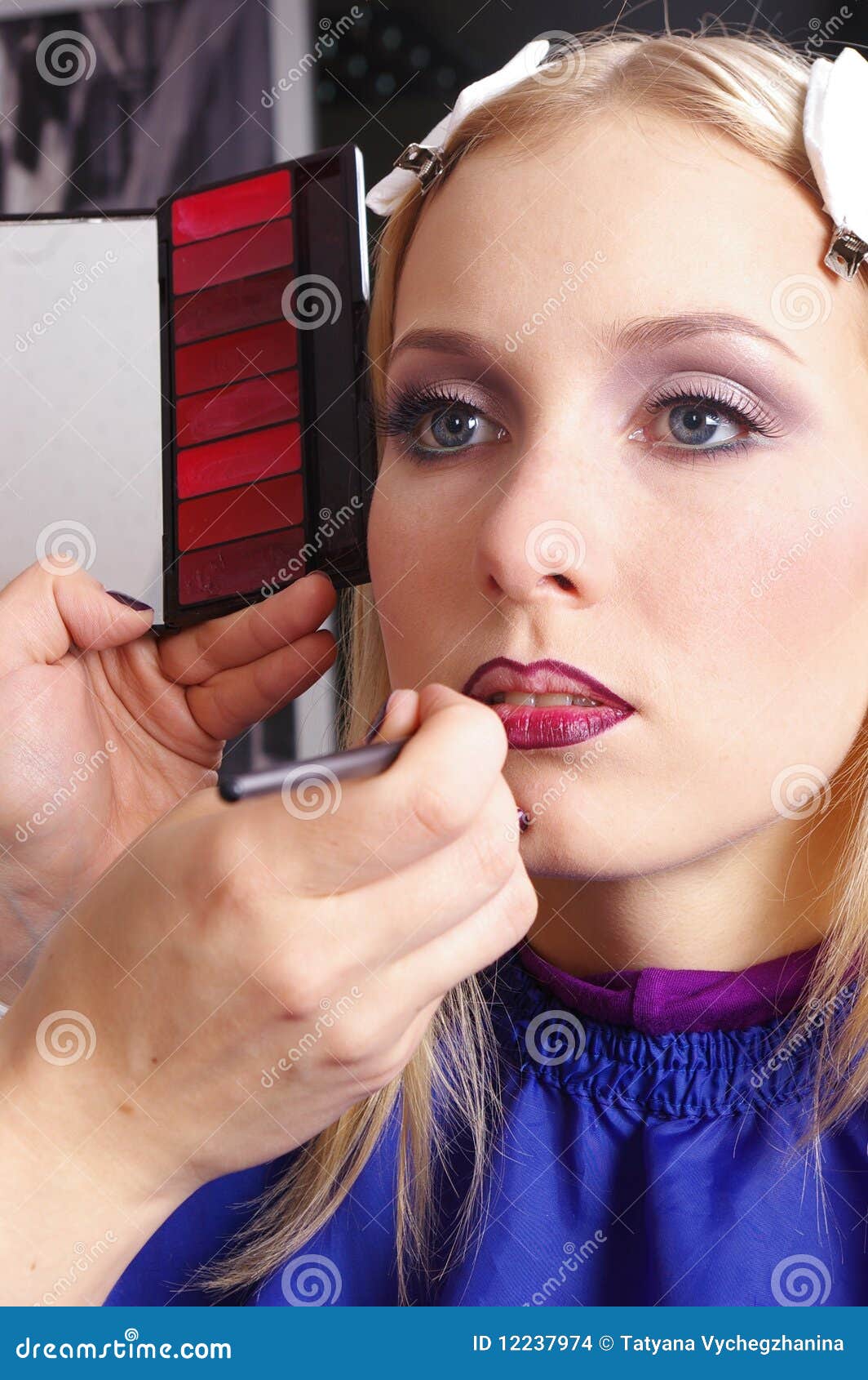 Makeup Artist Tracing Red Lipstick on the Lips Stock Photo - Image of ...