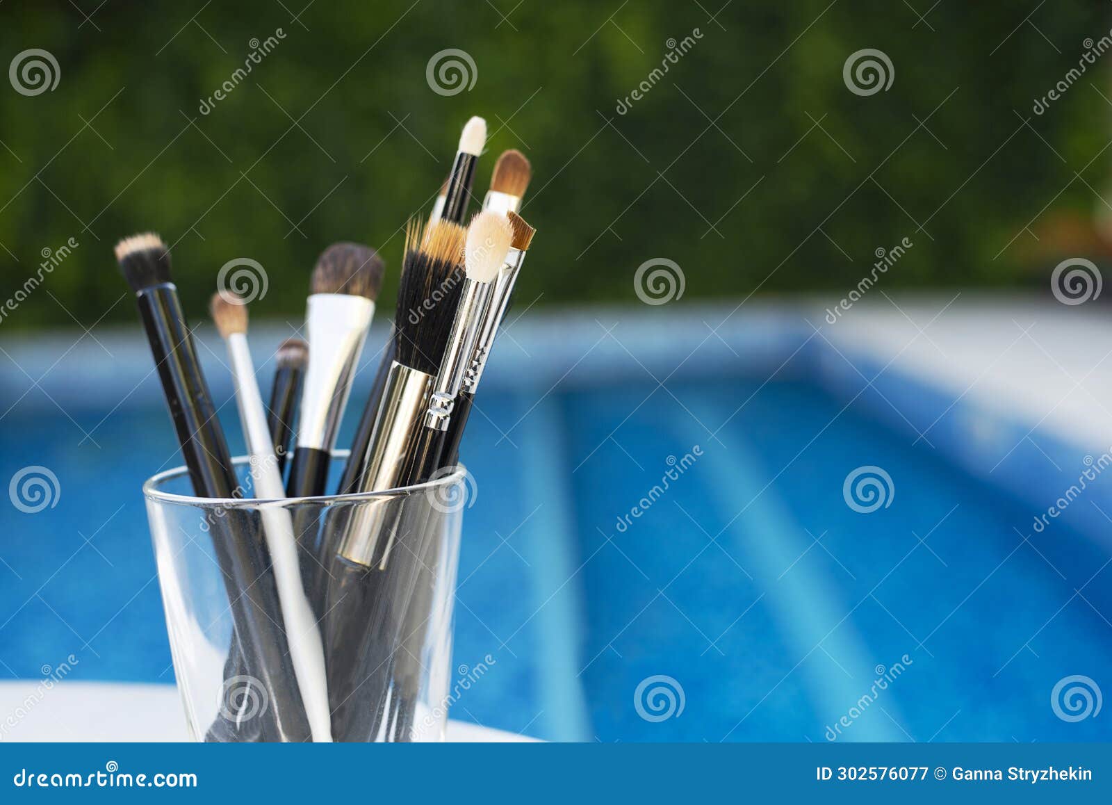 Makeup Brushes on a Background of a Swimming Pool Stock Image - Image ...