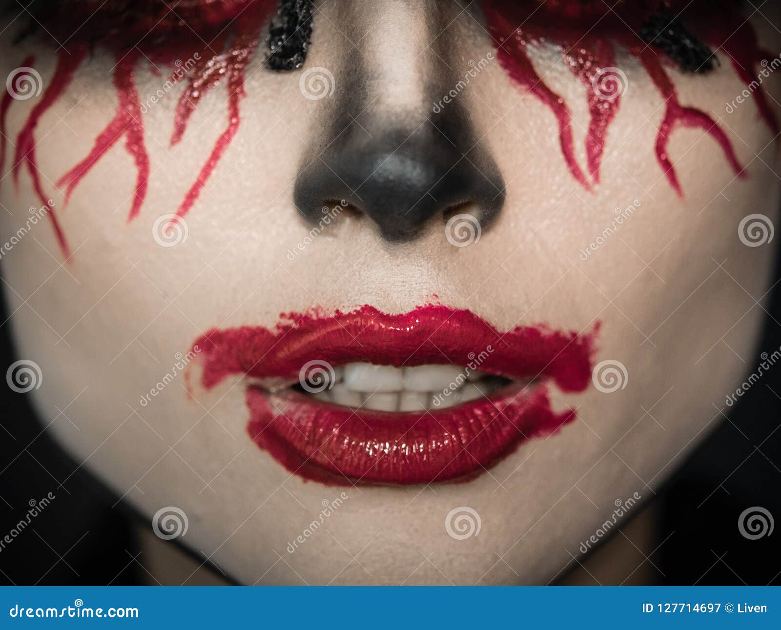 Makeup for Halloween. Scary Lips in the Blood and Crooked Teeth. Stock ...