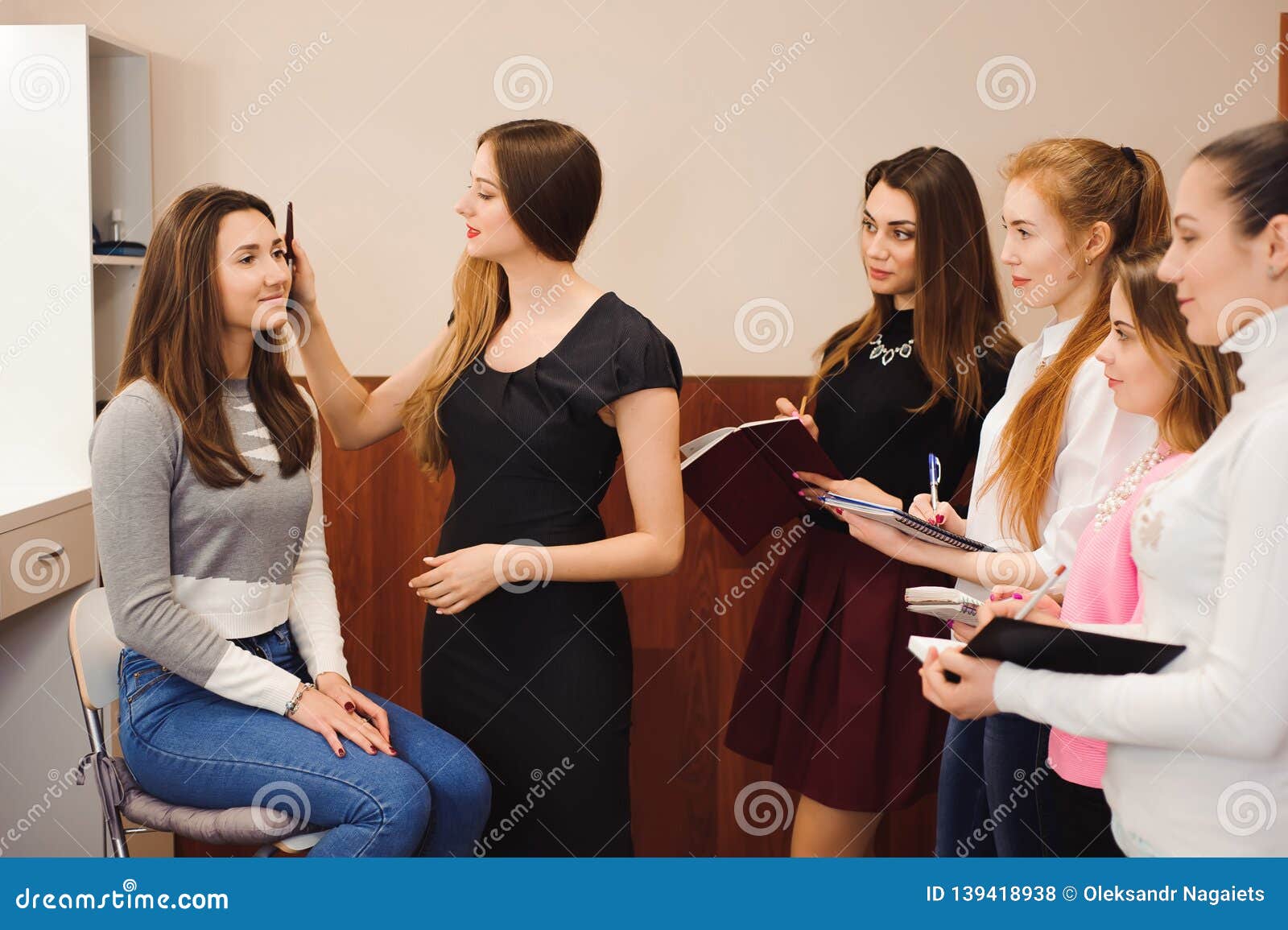 Makeup Teacher with Her Student Girls. Makeup Tutorial Lesson Stock ...