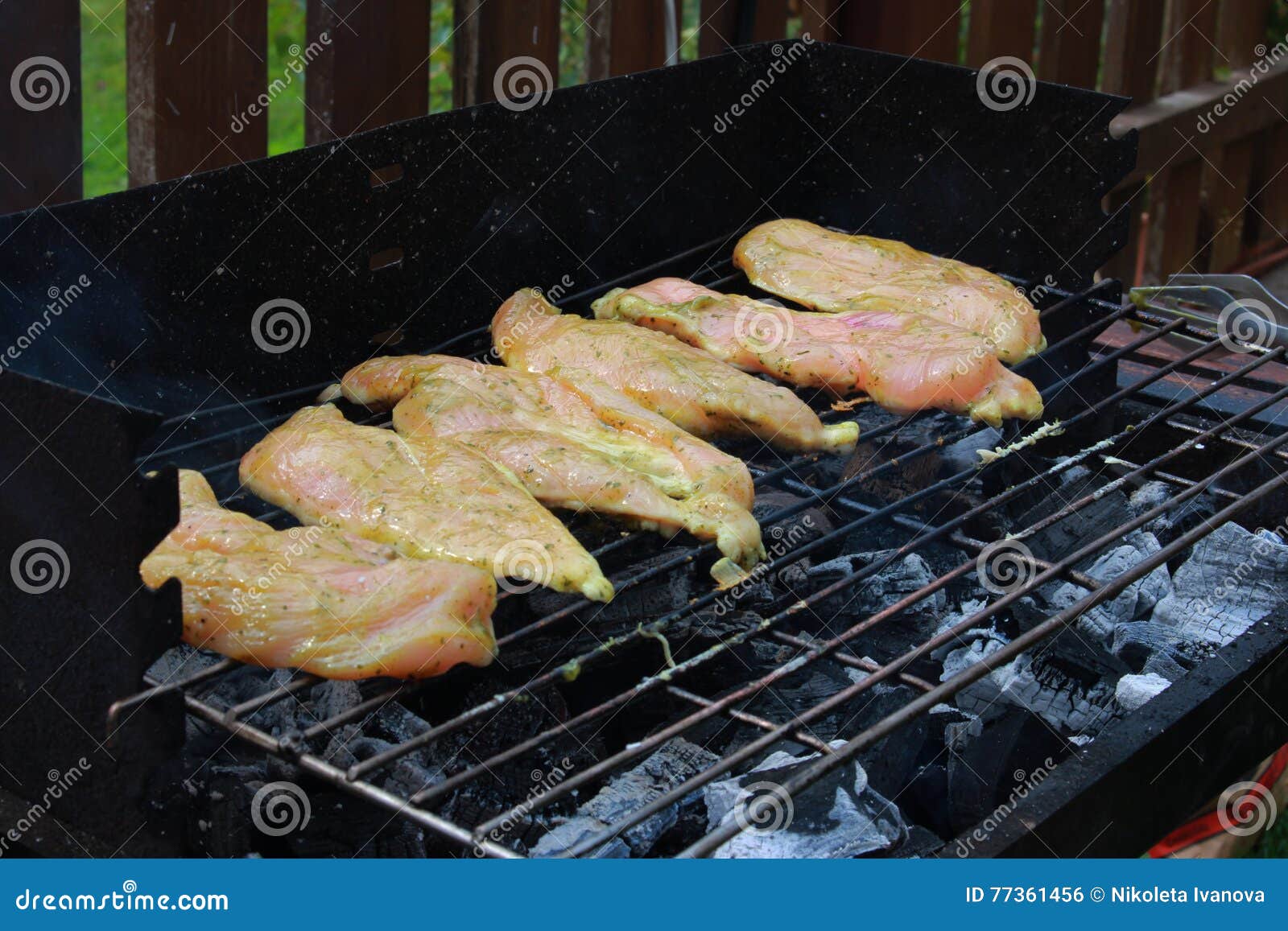 Making barbecue outside stock photo. Image of barbecue - 77361456