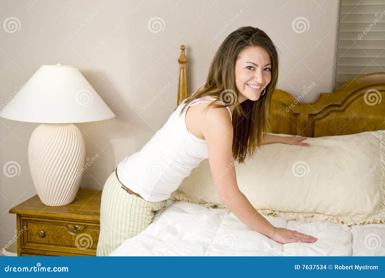 Making the bed stock photo. Image of female, furniture - 7637534