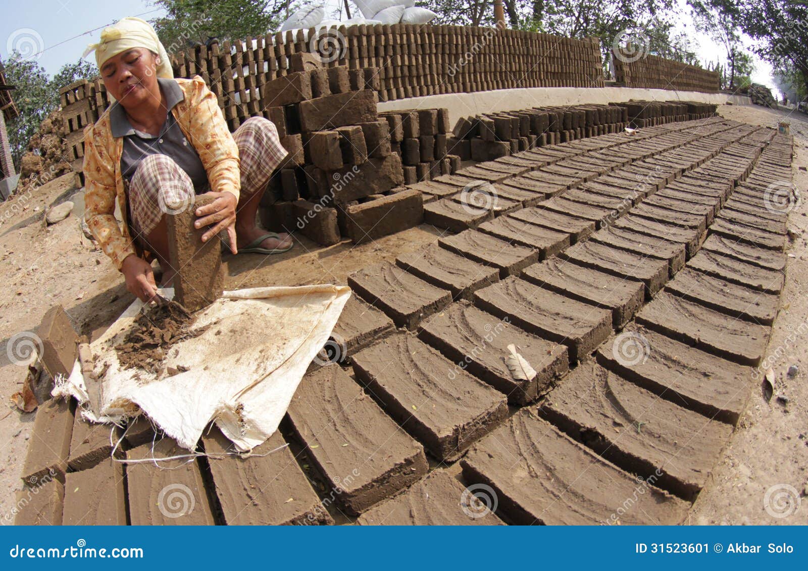 Making bricks from clay editorial photo. Image of improvement - 31523601