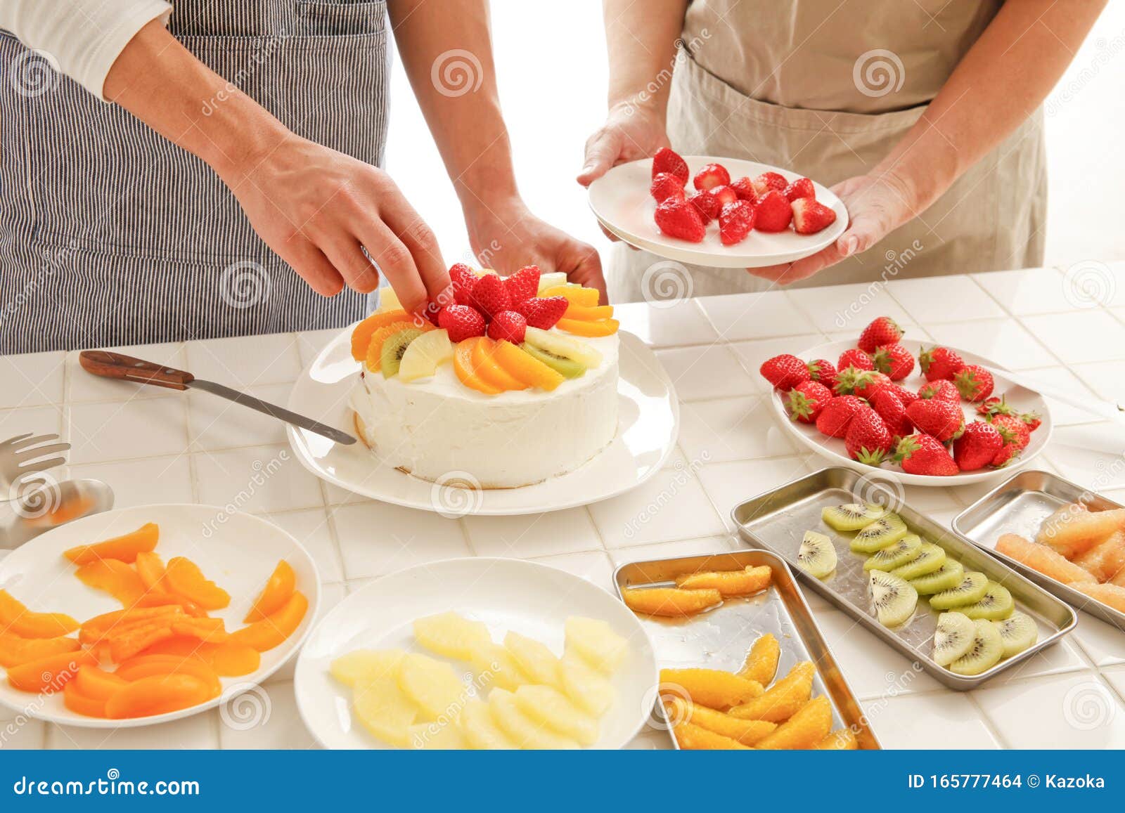 Making Cake with Couple, Kitchen Table with Ingredients Stock Photo ...