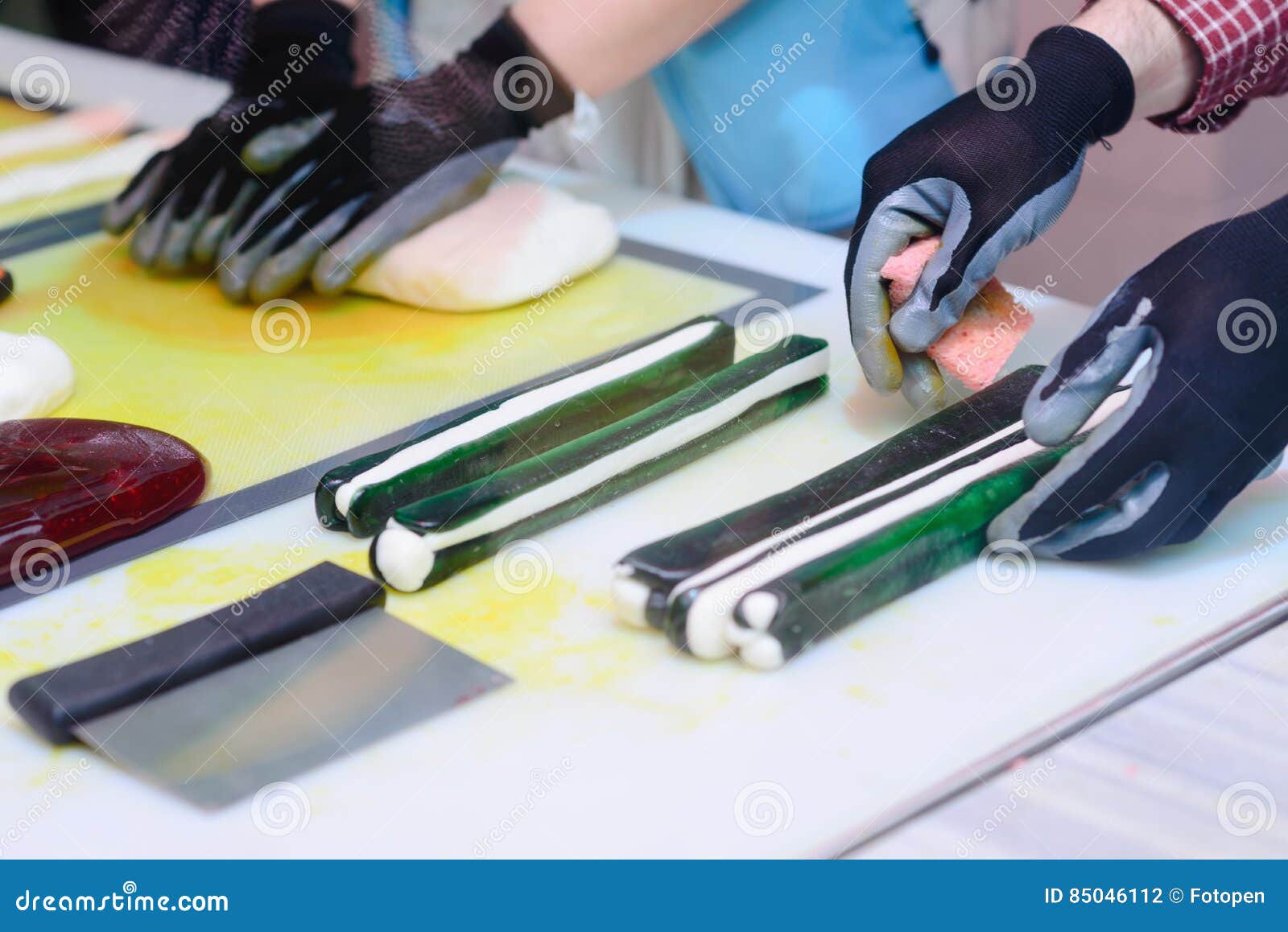 Making candies by hand stock photo. Image of professional - 85046112