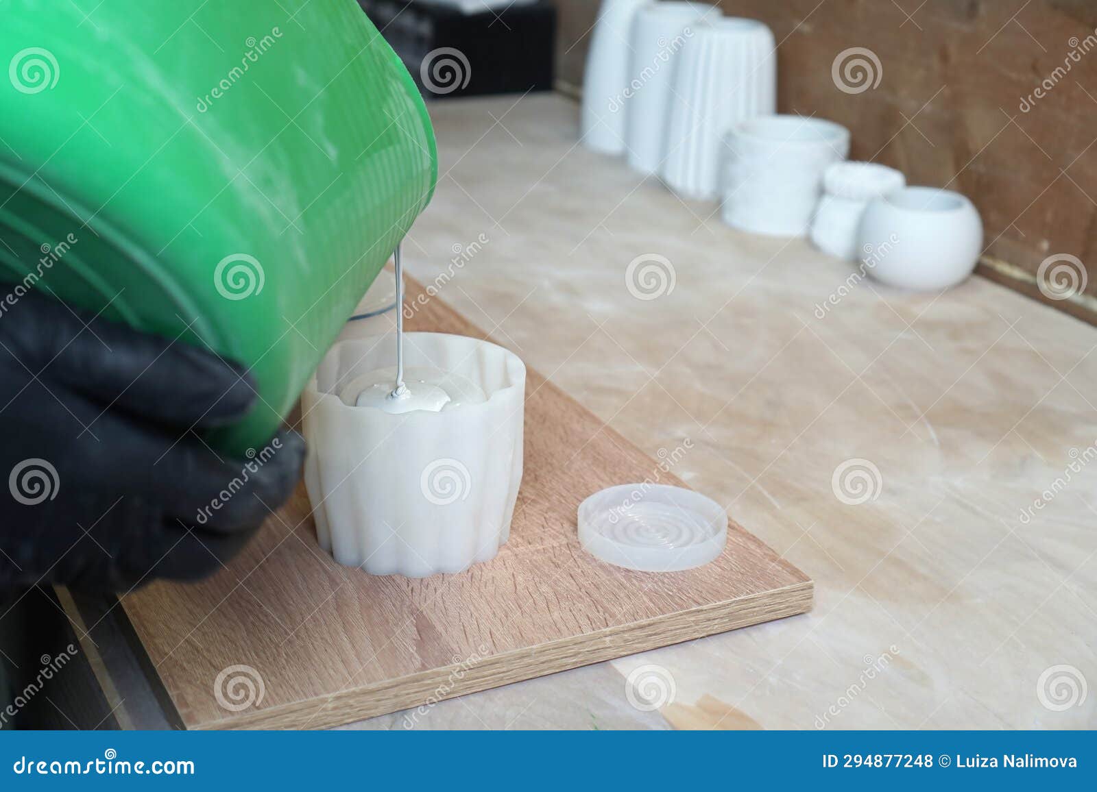 Pouring Plaster into Special Silicone Molds. Stock Photo - Image of ...