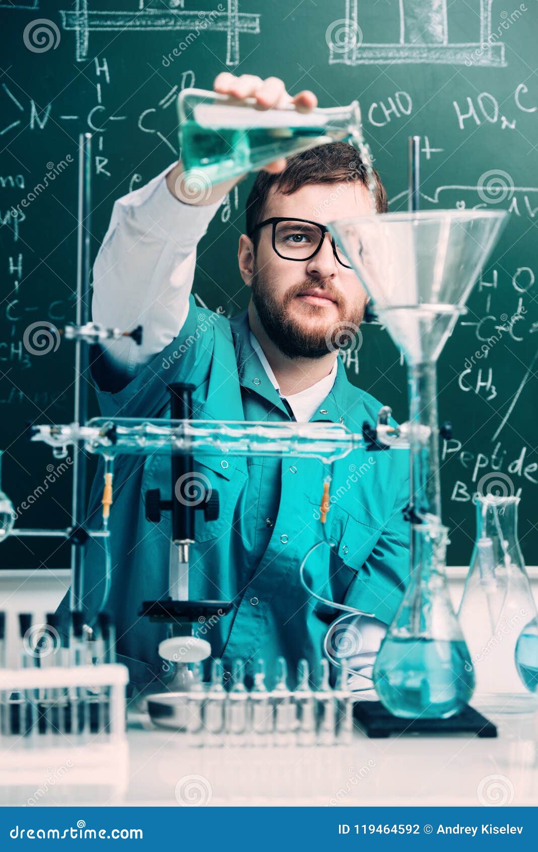Making chemical experiment stock photo. Image of male - 119464592
