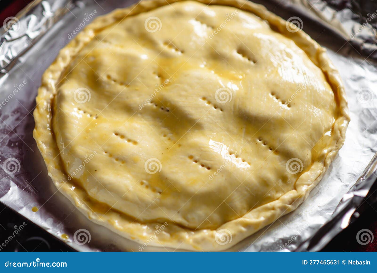 Making a Closed Pie. Round Raw Pie on a Baking Sheet Stock Image ...
