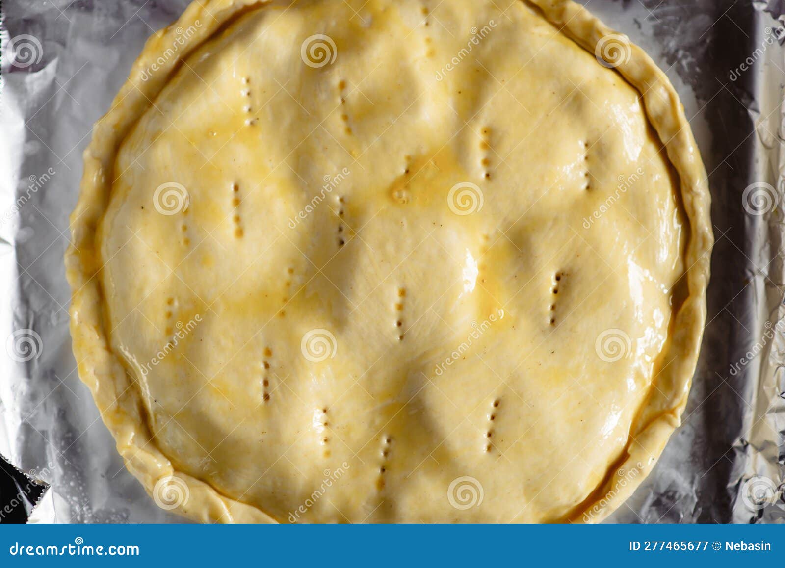 Making a Closed Pie. Round Raw Pie on a Baking Sheet. Spread with ...