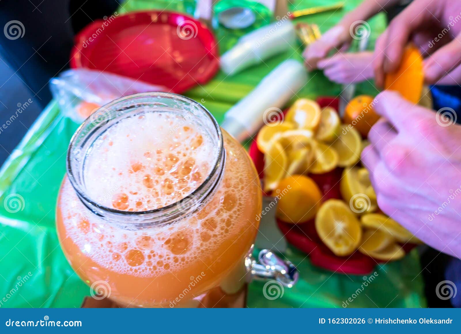 Making Cool Citrus Punch stock photo. Image of fruity - 162302026