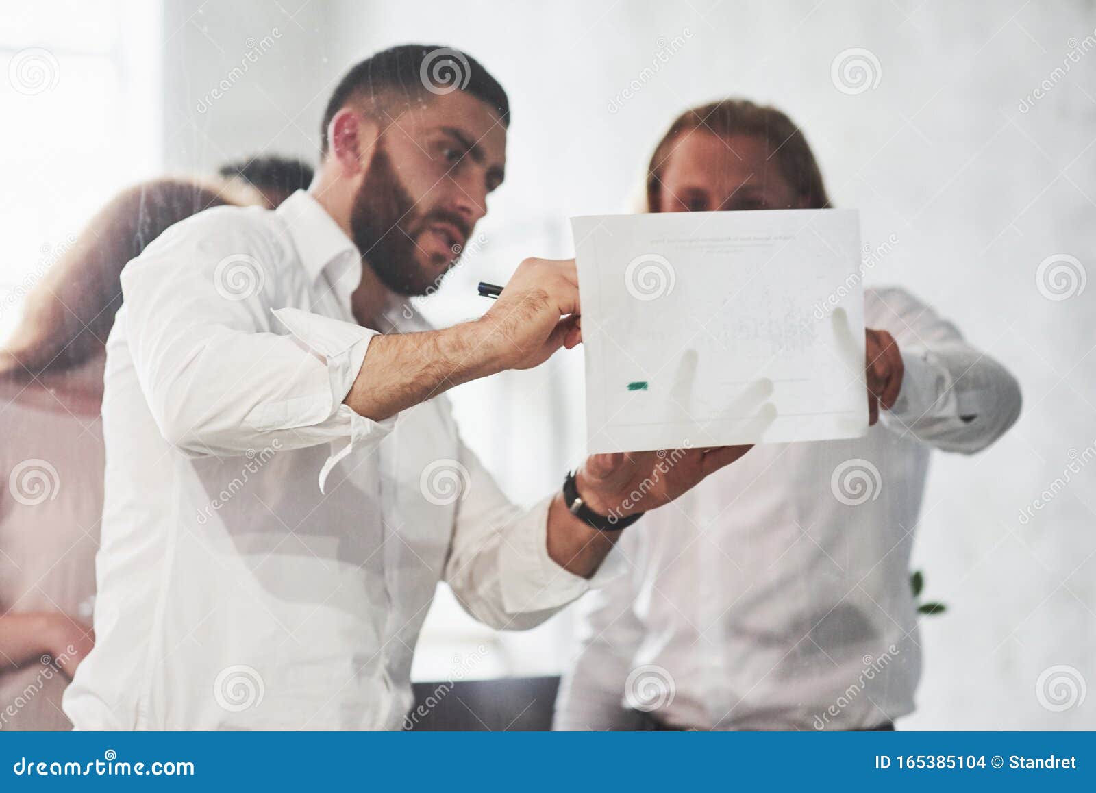 Making Corrections. People Working in the Office and Discuss Some ...