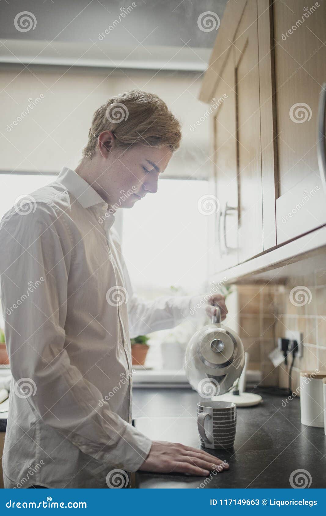 Making a Cup of Tea stock image. Image of pouring, domestic - 117149663