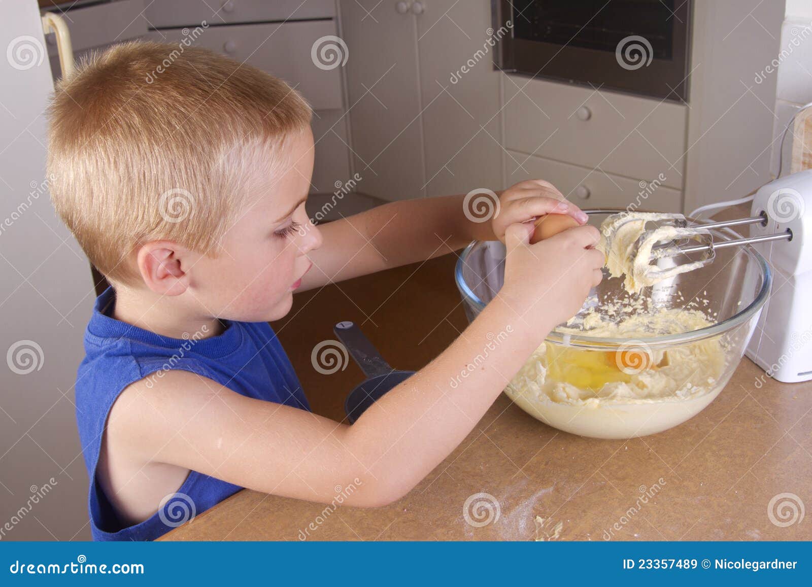 Making cupcakes stock image. Image of concentration, learning - 23357489