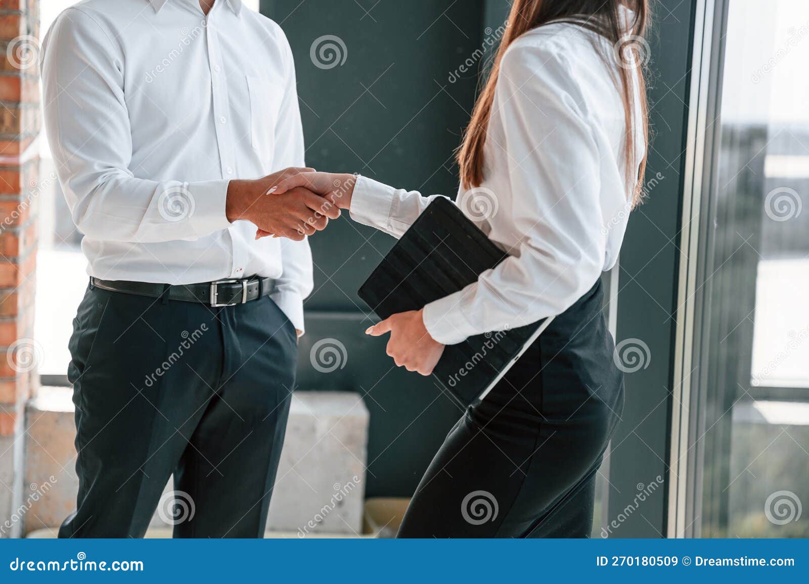 Making a Deal, Handshake. Industry Workers are in the Building at ...