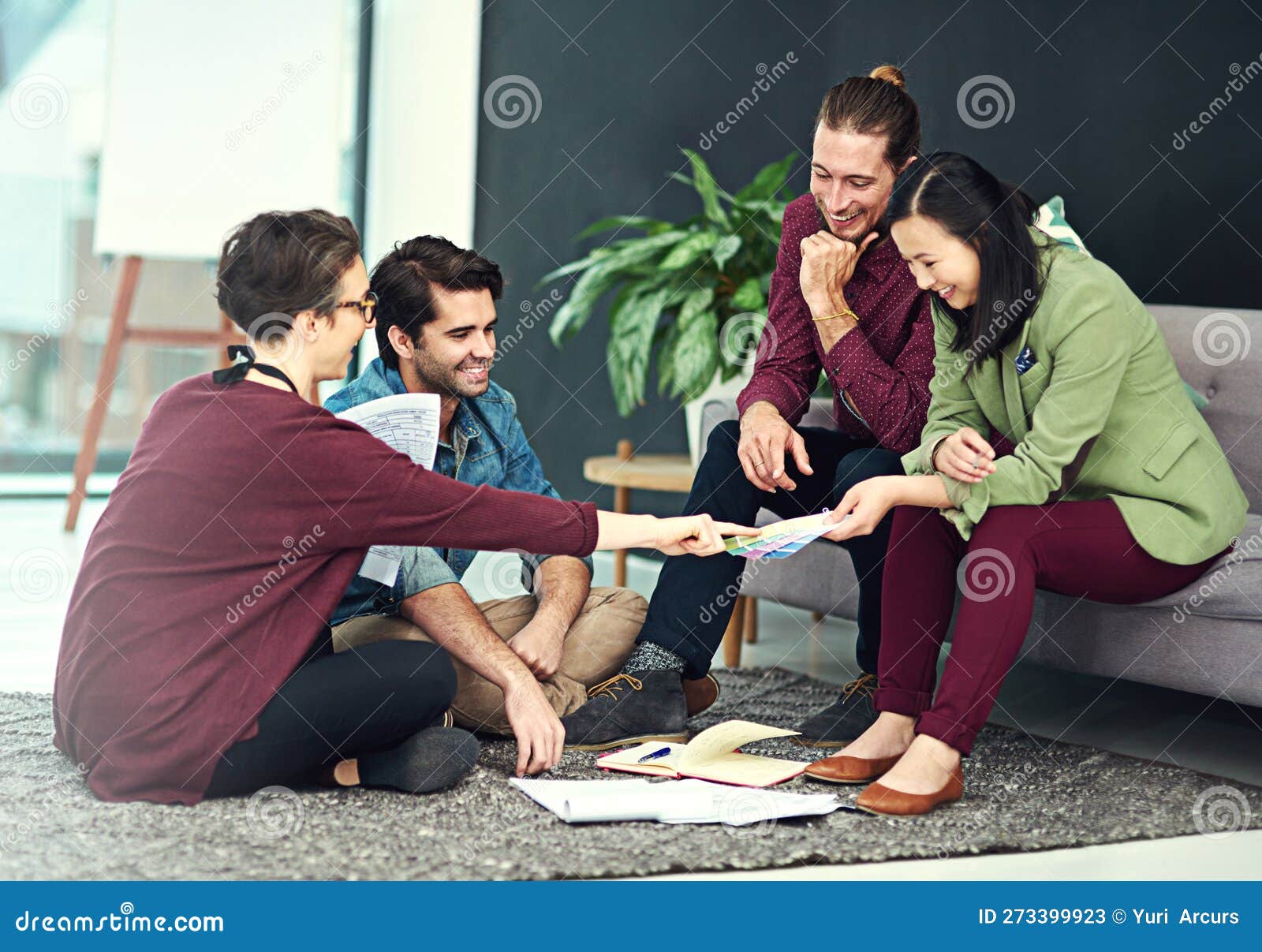 Making Decisions As a Team. a Group of Young Creatives Having a Meeting ...