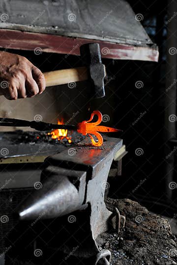 Making a Decorative Pattern on the Anvil Stock Image - Image of motion ...