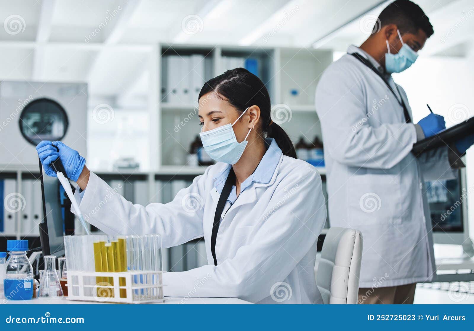 Making a Difference through Research. Two Young Researchers Working in ...