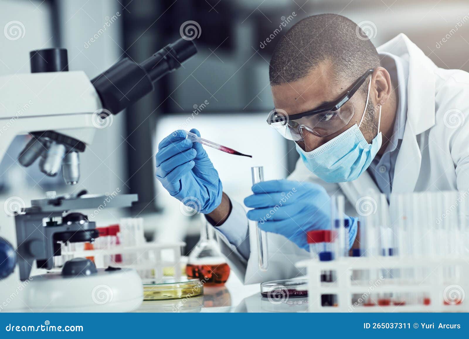 Making a Discovery in Science. a Young Male Scientist Working in His ...