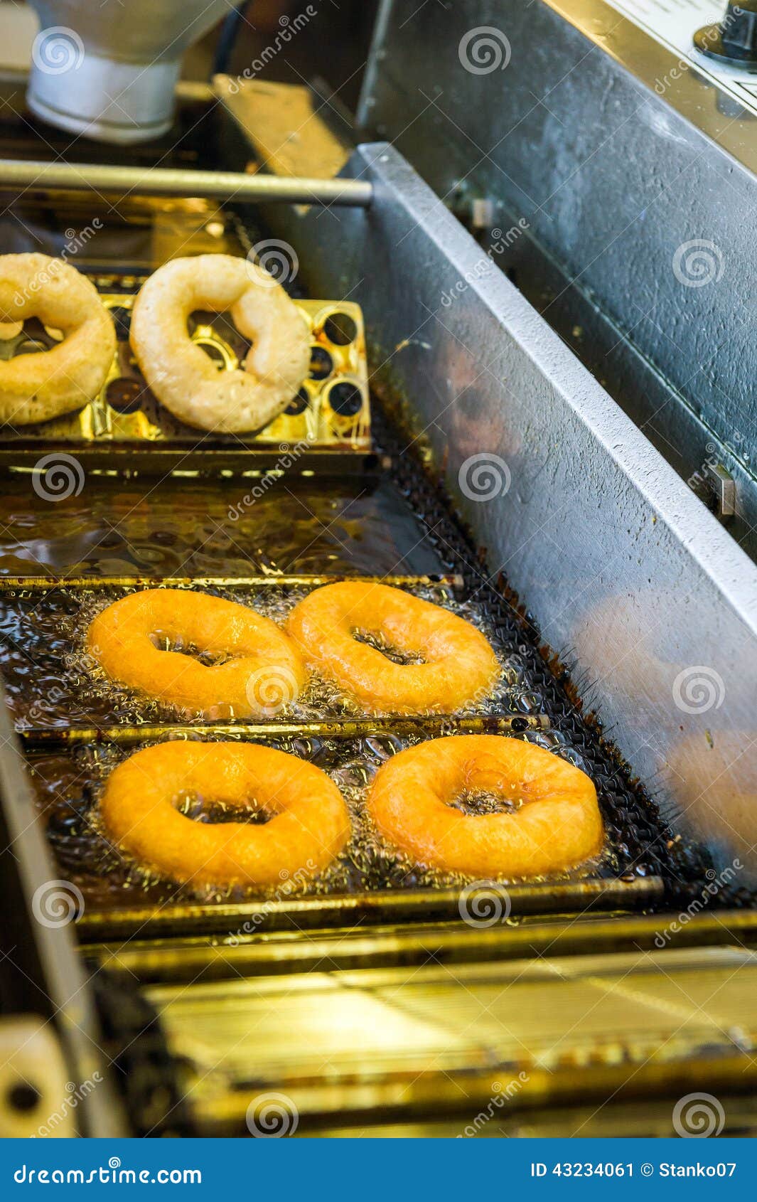 Making donuts stock image. Image of baking, aroma, doughnut - 43234061