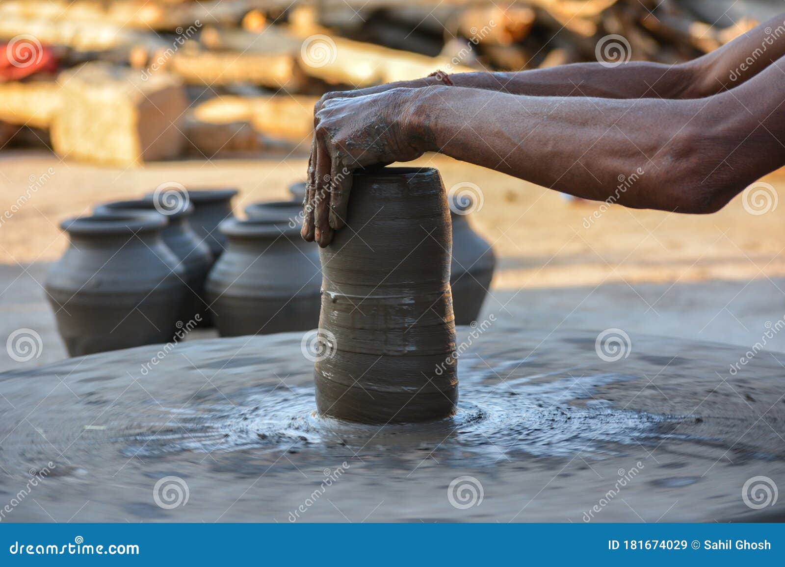 Making of Earthen Pot with the Help of the Hand Wheel. Stock Image ...